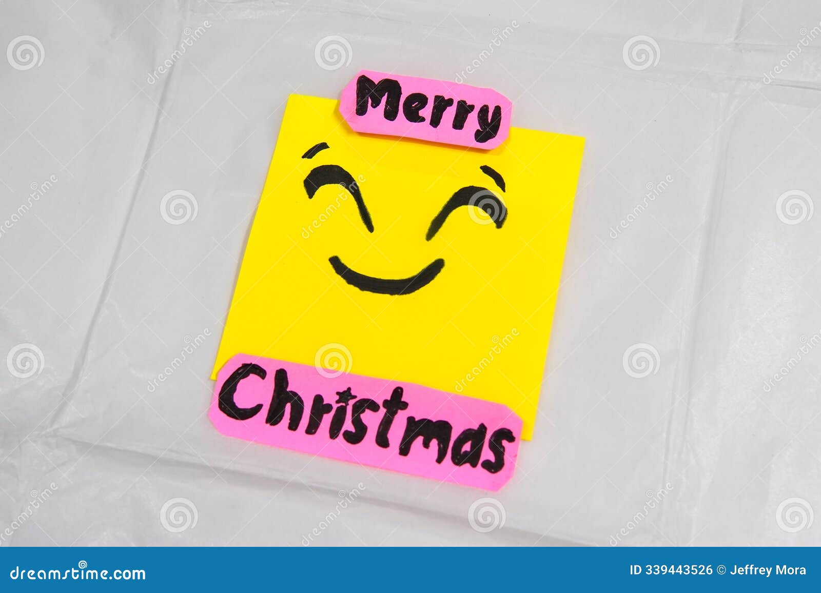 Merry Christmas! Write on Sticky Notes with Happy Face Stock Photo ...