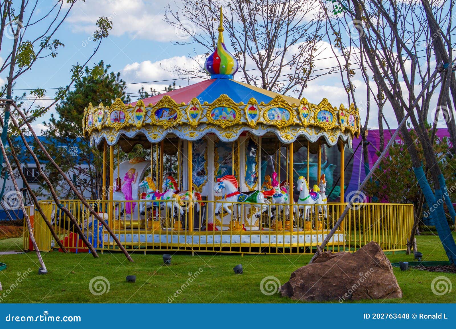 A Merry-go-round Playground in a Park Editorial Stock Photo - Image of ...
