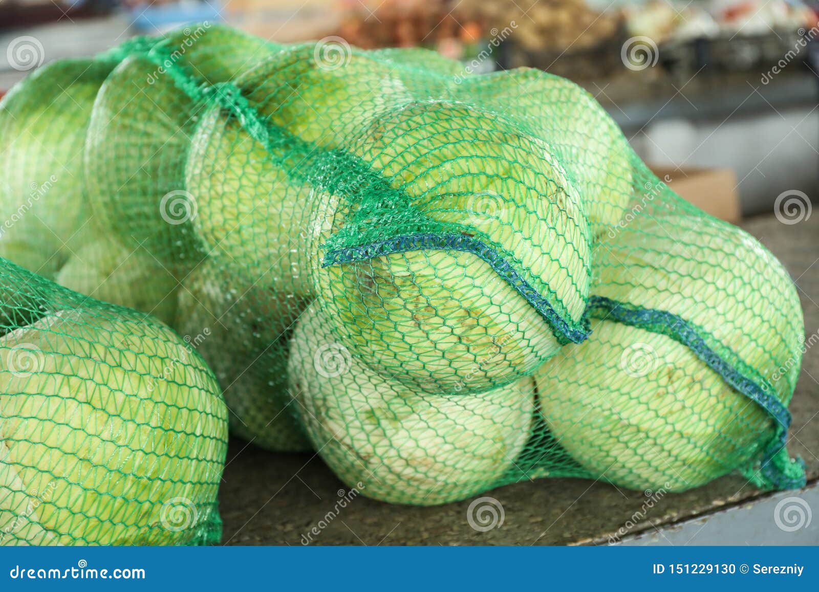 Mesh Bags with Fresh Cabbages at Market Stock Photo - Image of cabbage ...