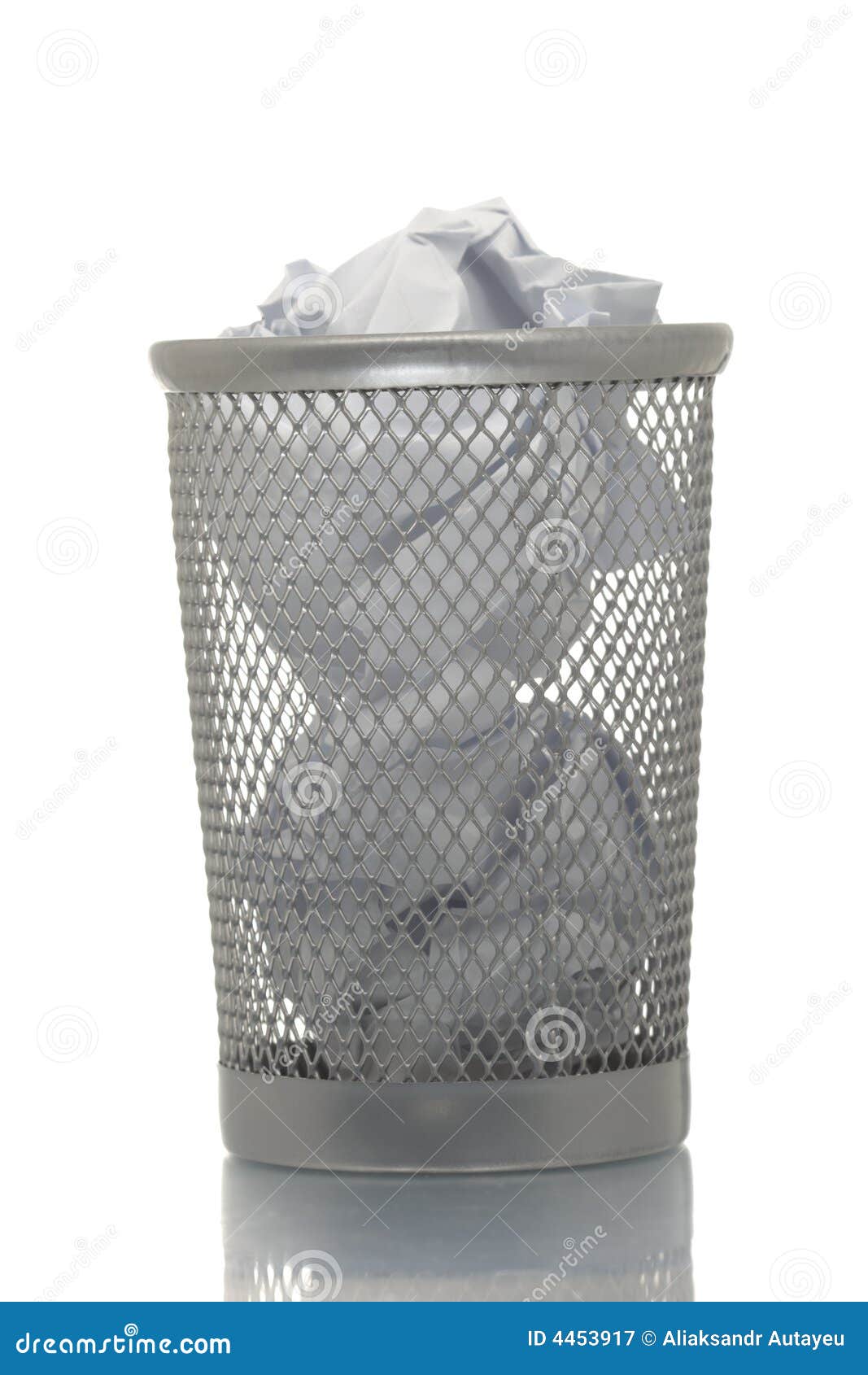 Mesh Trash Bin Full Of Paper Picture. Image: 4453917