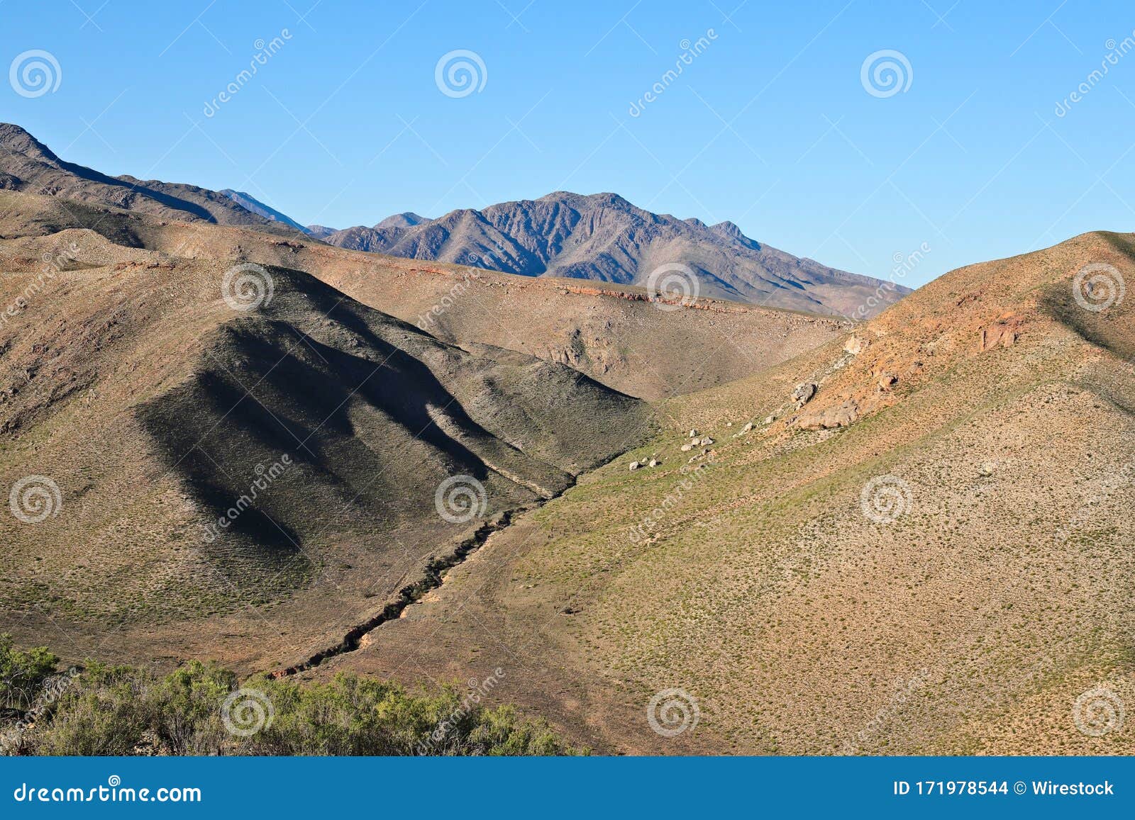 Mesmerizing Scenery of Hills Touching the Clear Sky Stock Photo - Image ...