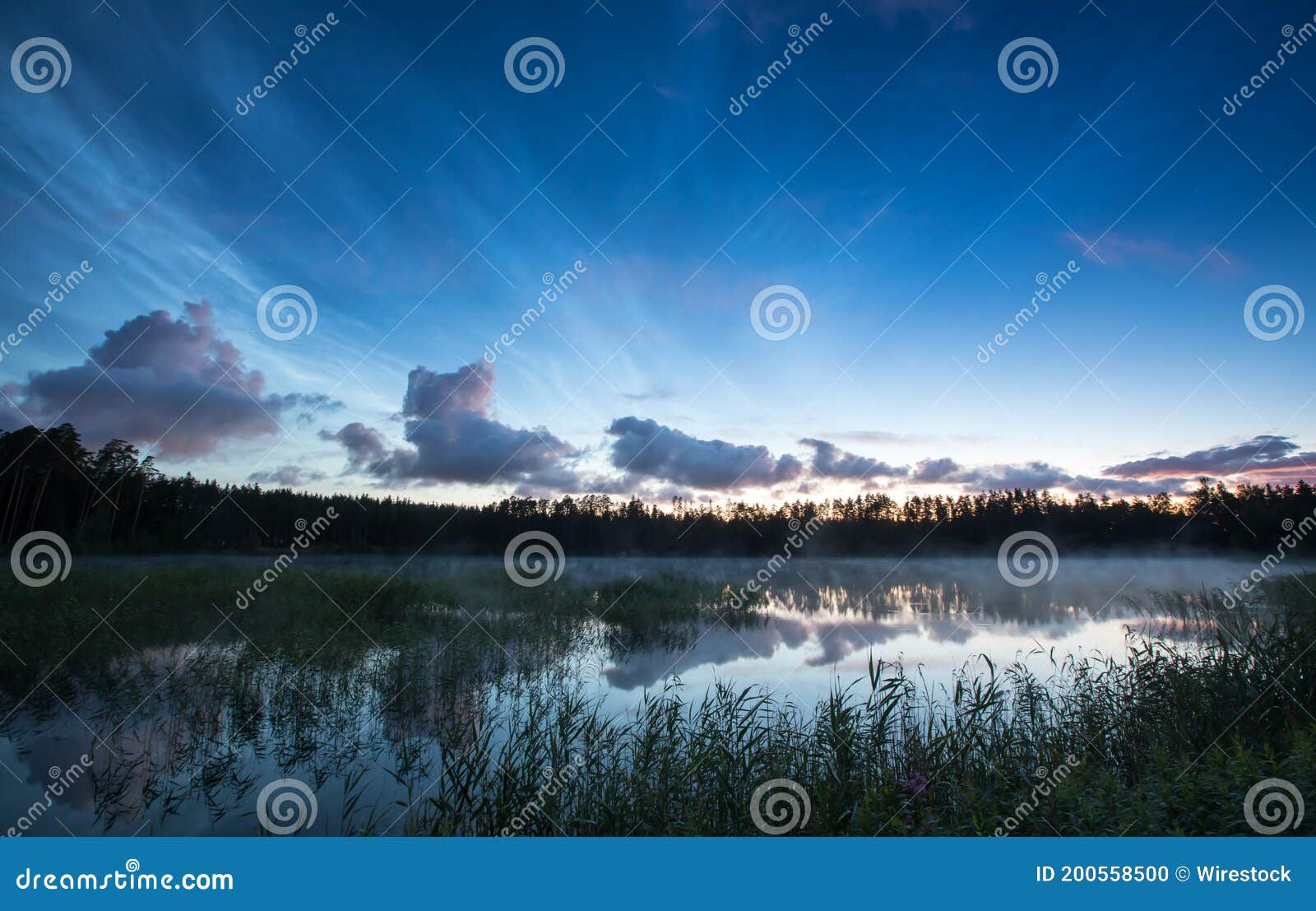 Mesmerizing Scenery of a Reflection of the Sunset in the Lake Stock ...