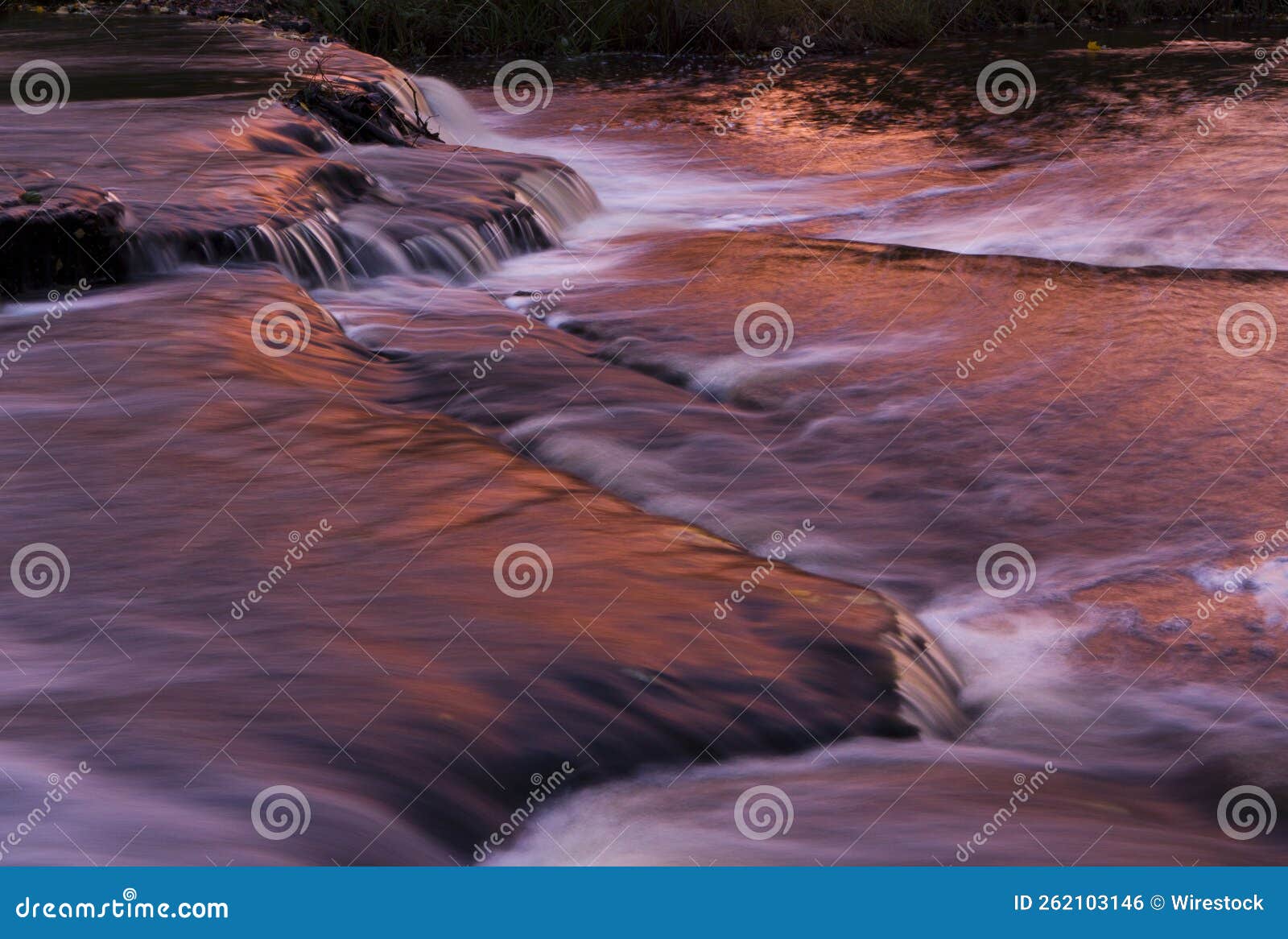 Mesmerizing Scenery of Waterfall at Sunset Stock Photo - Image of flow ...