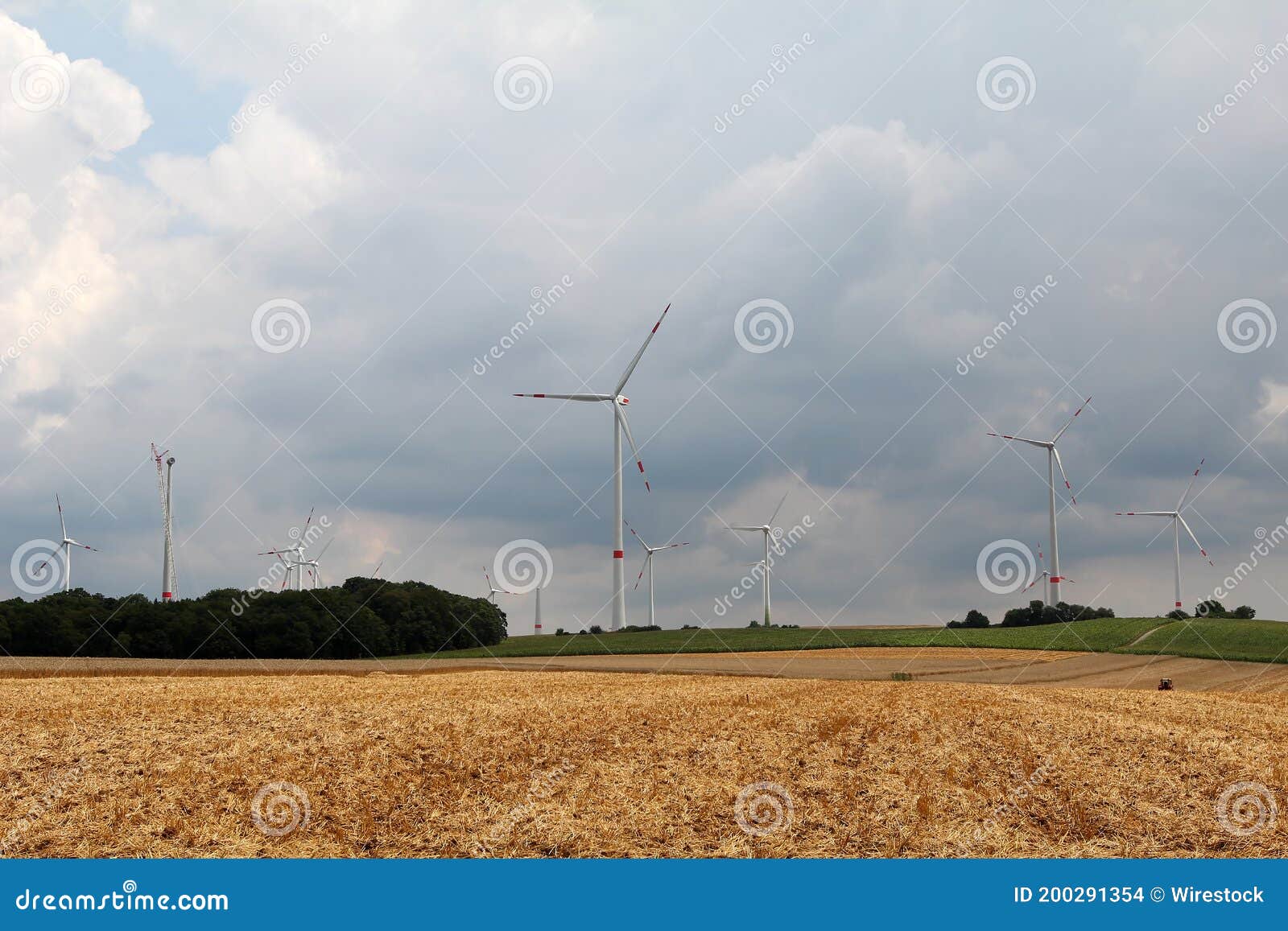 Mesmerizing Shot of a Windmill Generator in a Wide Yard Stock Photo ...