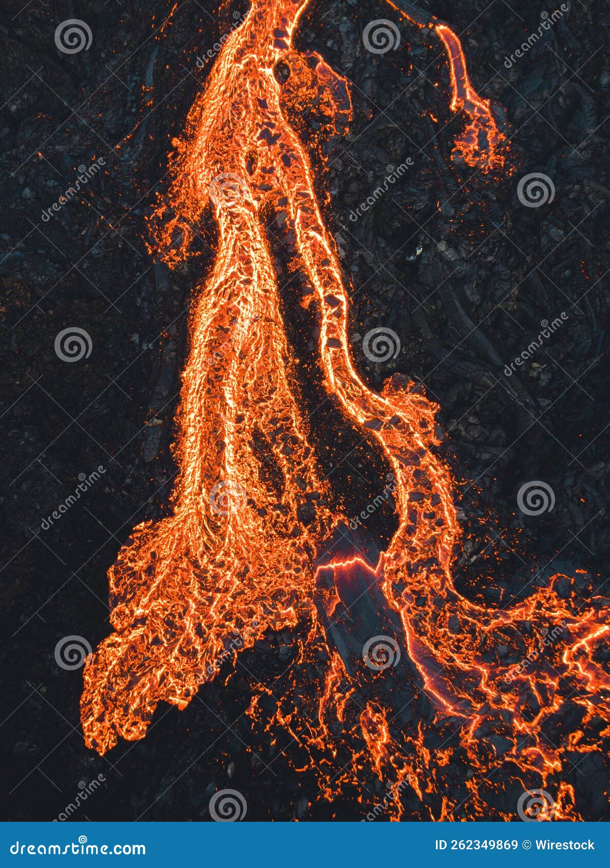 Mesmerizing Vertical Shot of Lava Flowing Over the Bumpy Mountain Stock ...
