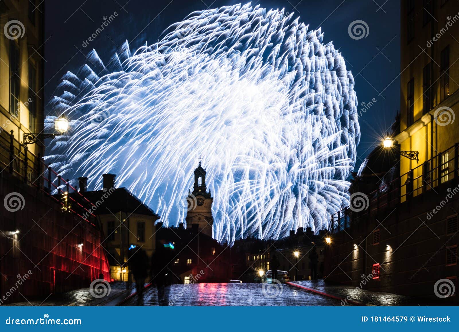 Mesmerizing View of the Colorful Fireworks Behind the Buildings at ...