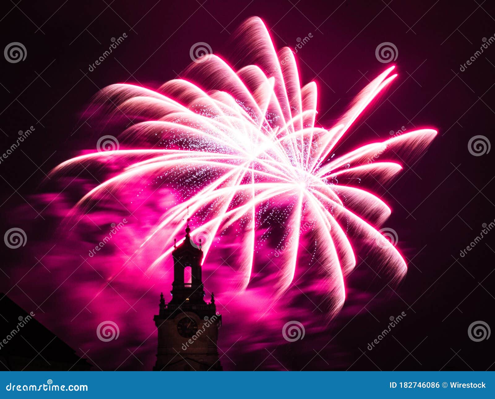 Mesmerizing View of the Colorful Fireworks Behind the Buildings at ...