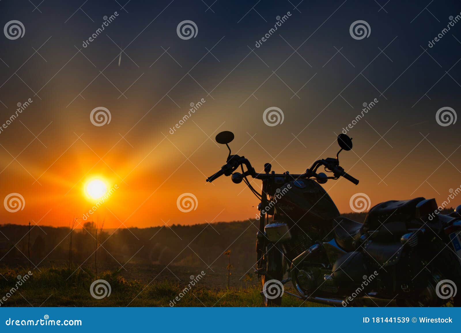 Mesmerizing View of the Motorbike in the Field during Sunset Stock ...