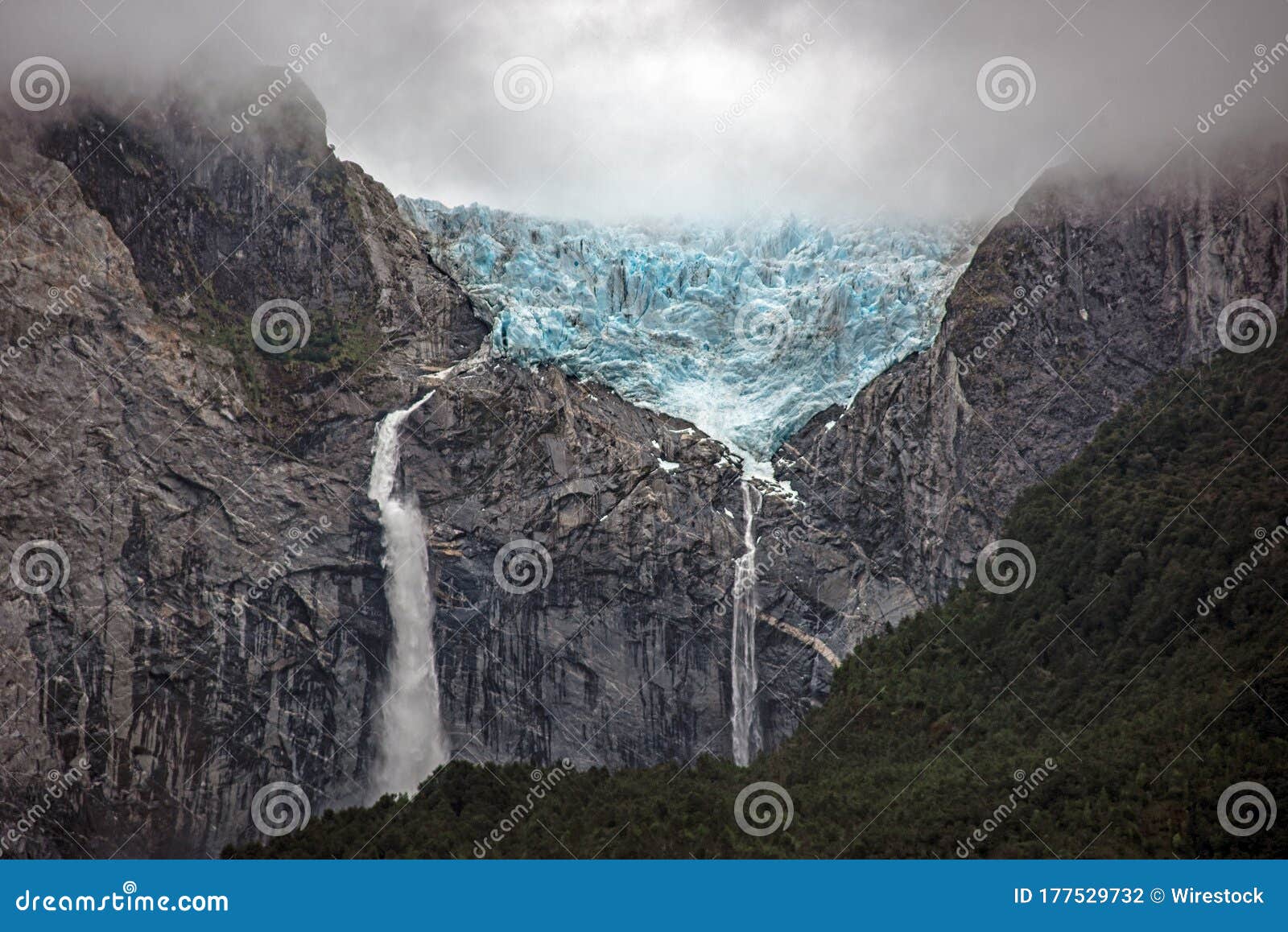 Mesmerizing View of the Rocky Mountains with a Waterfall Stock Photo ...