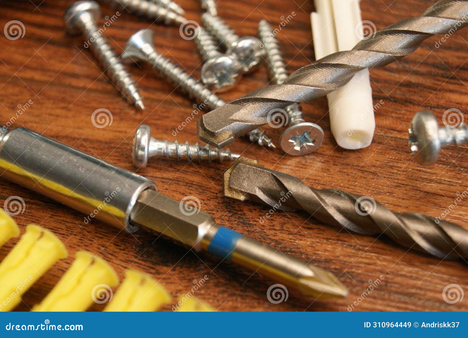 A Mess in the Assembly Work Process on the Table. Dowels, Screws, Drill ...