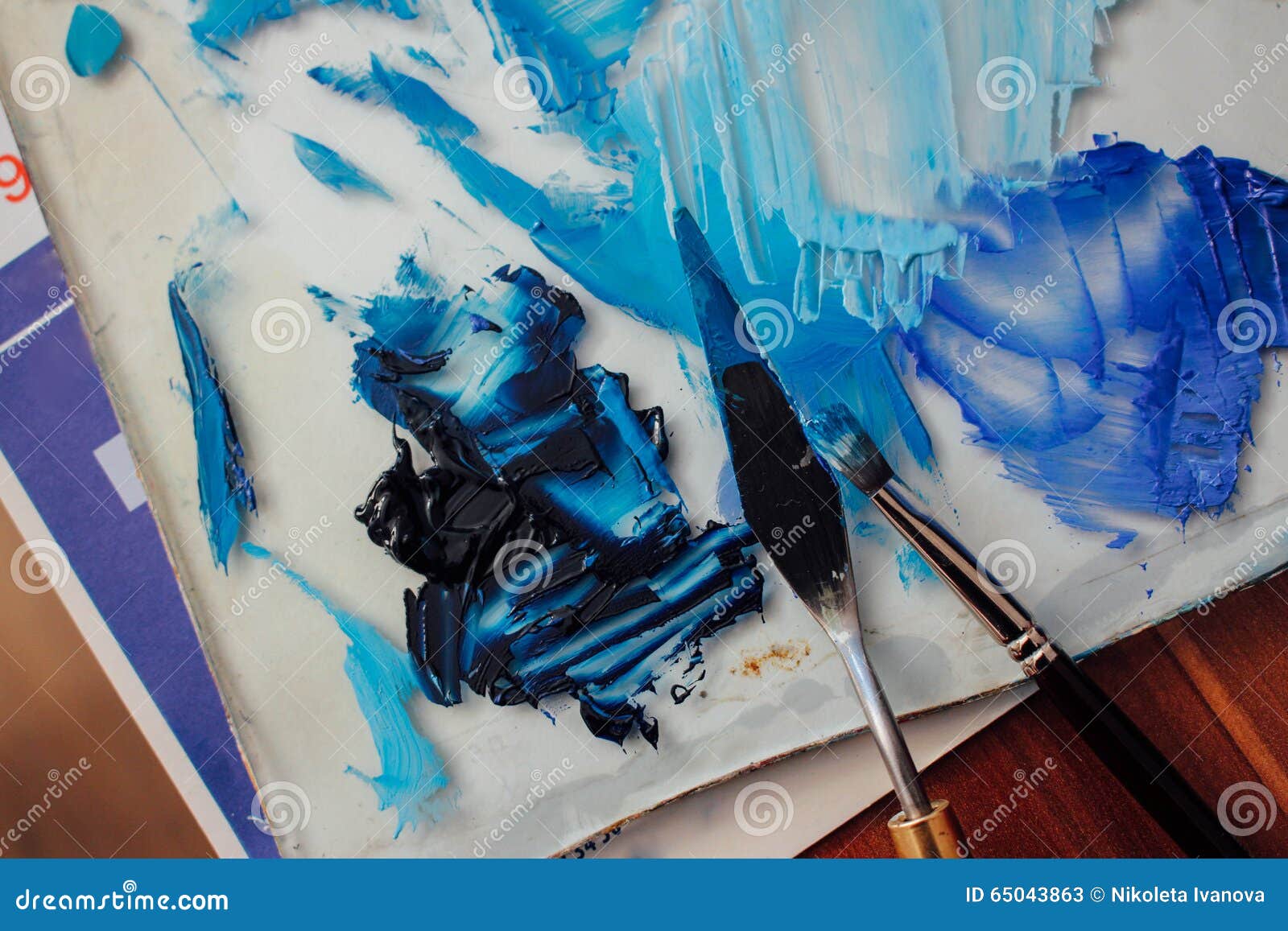 Mess of blue paints stock image. Image of paints, brush - 65043863