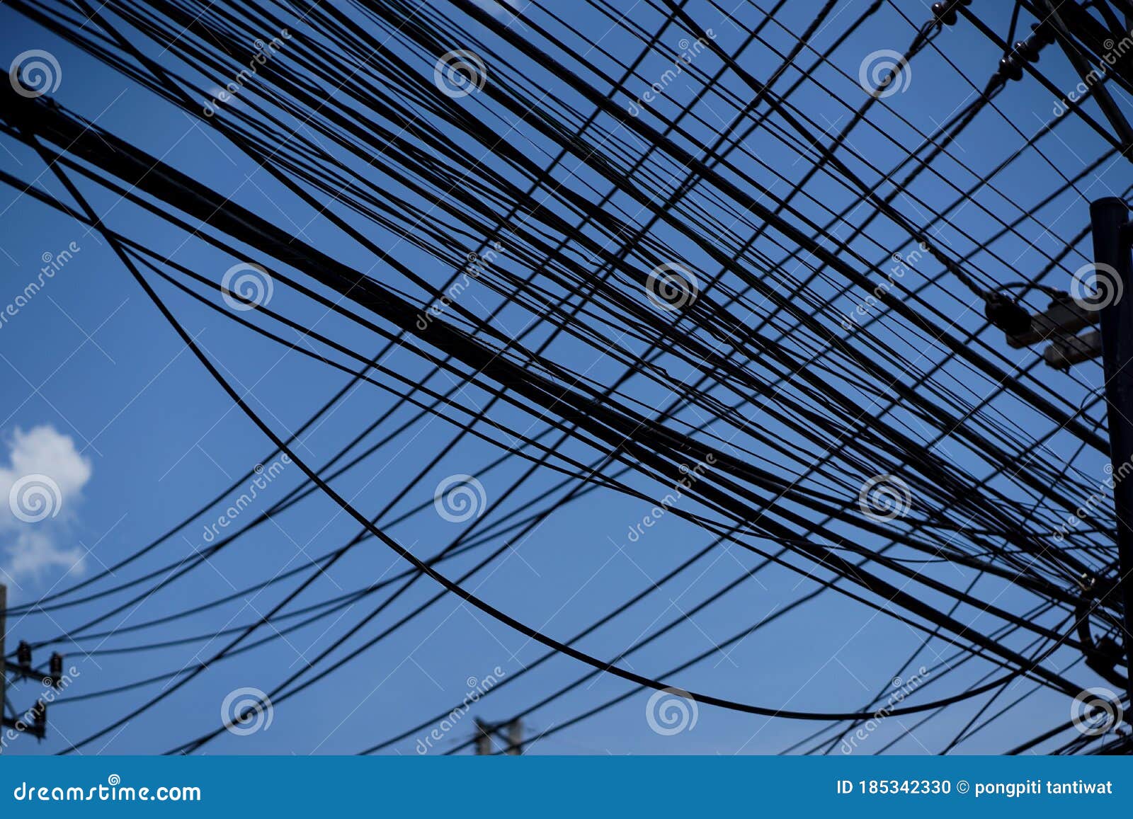 The Mess Electrical Wires With The Blue Sky Background Stock ...