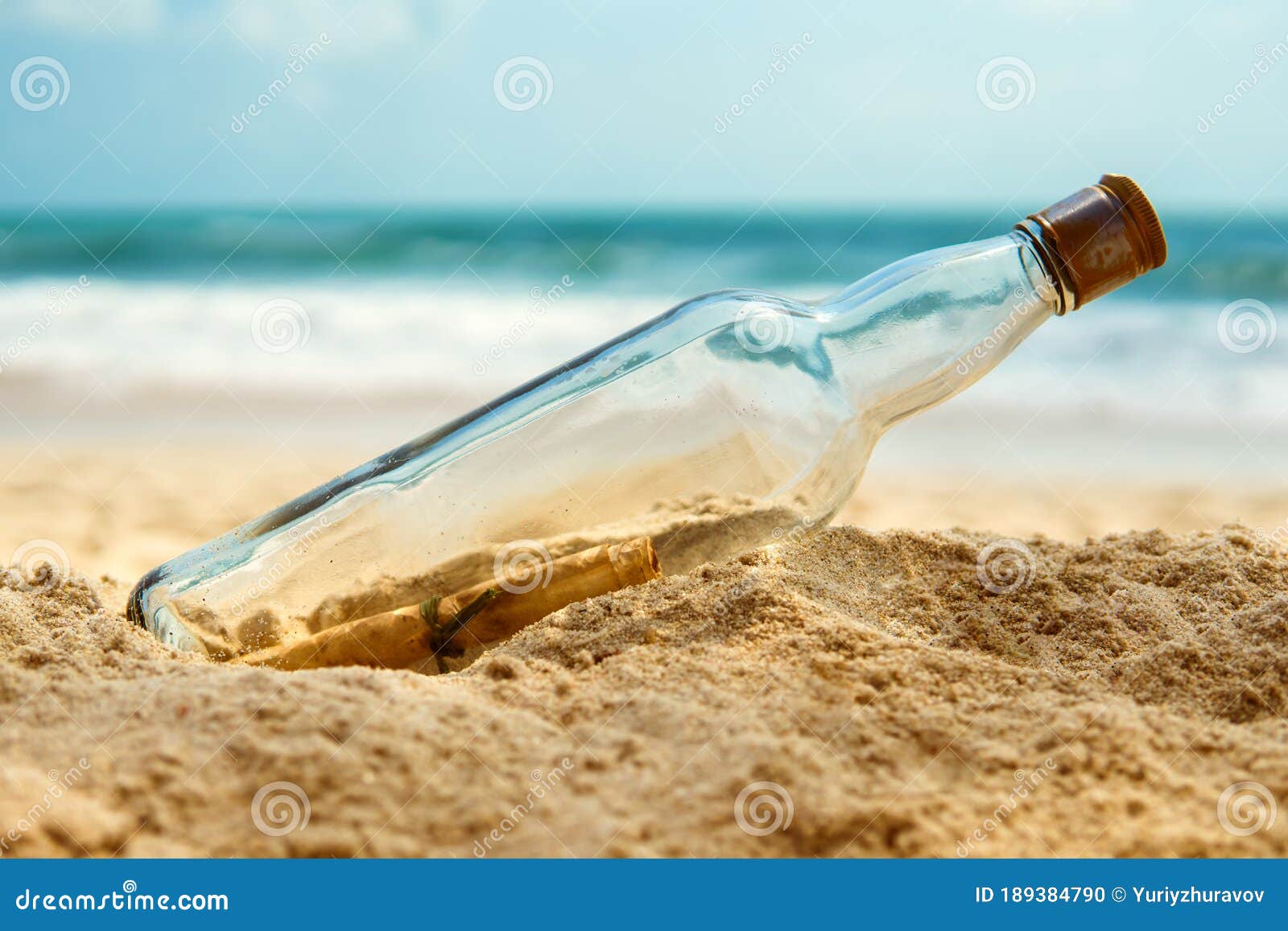 Message in a Bottle on the Shore of Desert Island Stock Photo - Image ...