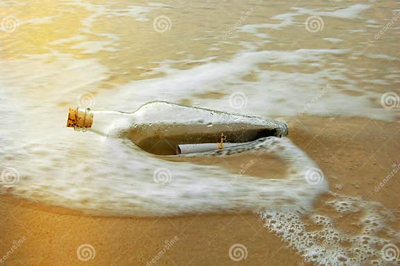 Message in a Bottle at Sunset Stock Photo - Image of seaside, castaway ...
