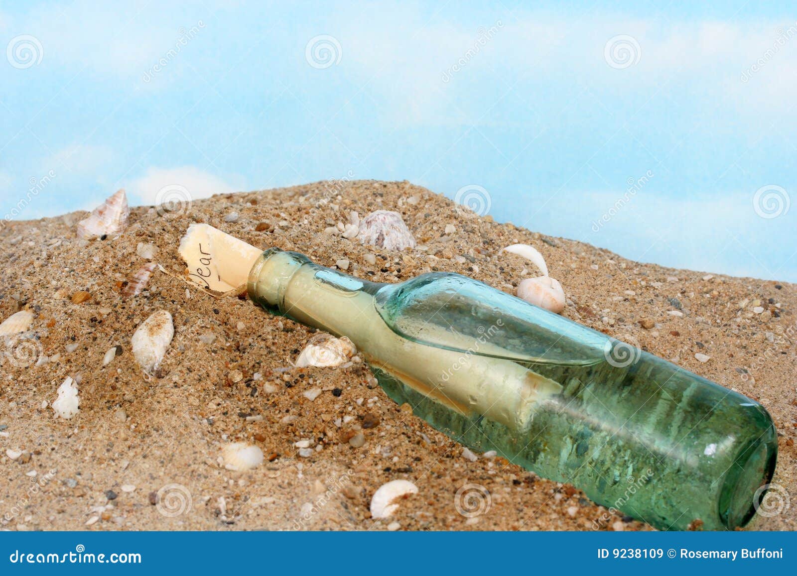 Message in a Bottle Washed Up on a Sandy Shore Stock Image - Image of ...