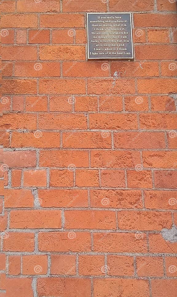 A Message of Joy on a Brick Wall Stock Image - Image of author ...