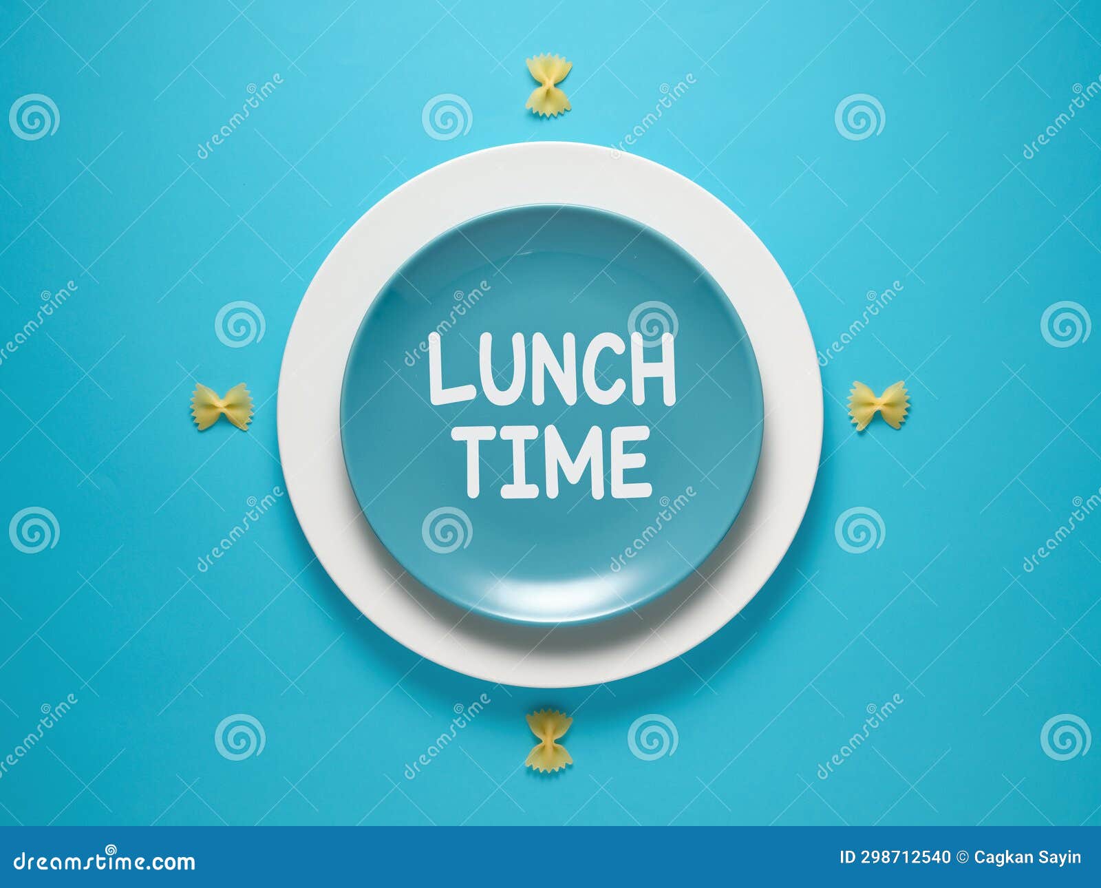 The Message Lunch Time Written on a Blue Plate Designed As a Clock ...