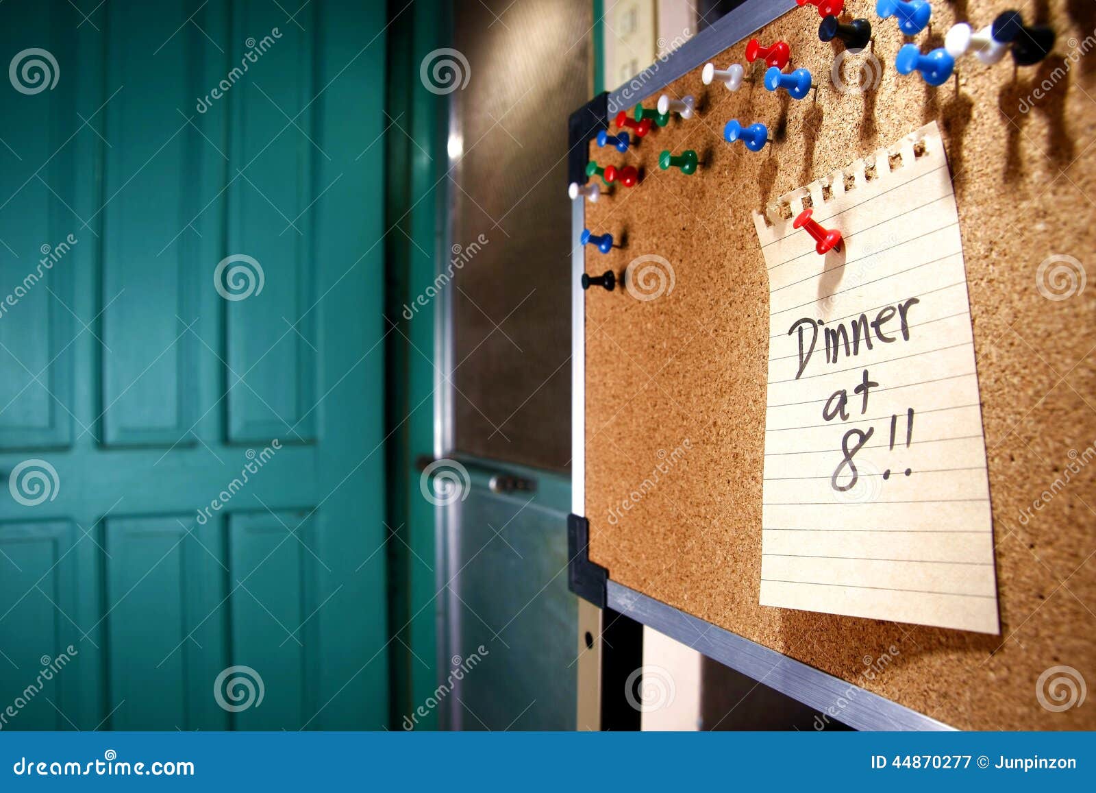 Message or Reminder Board with Dinner at 8 Note Stock Image - Image of ...