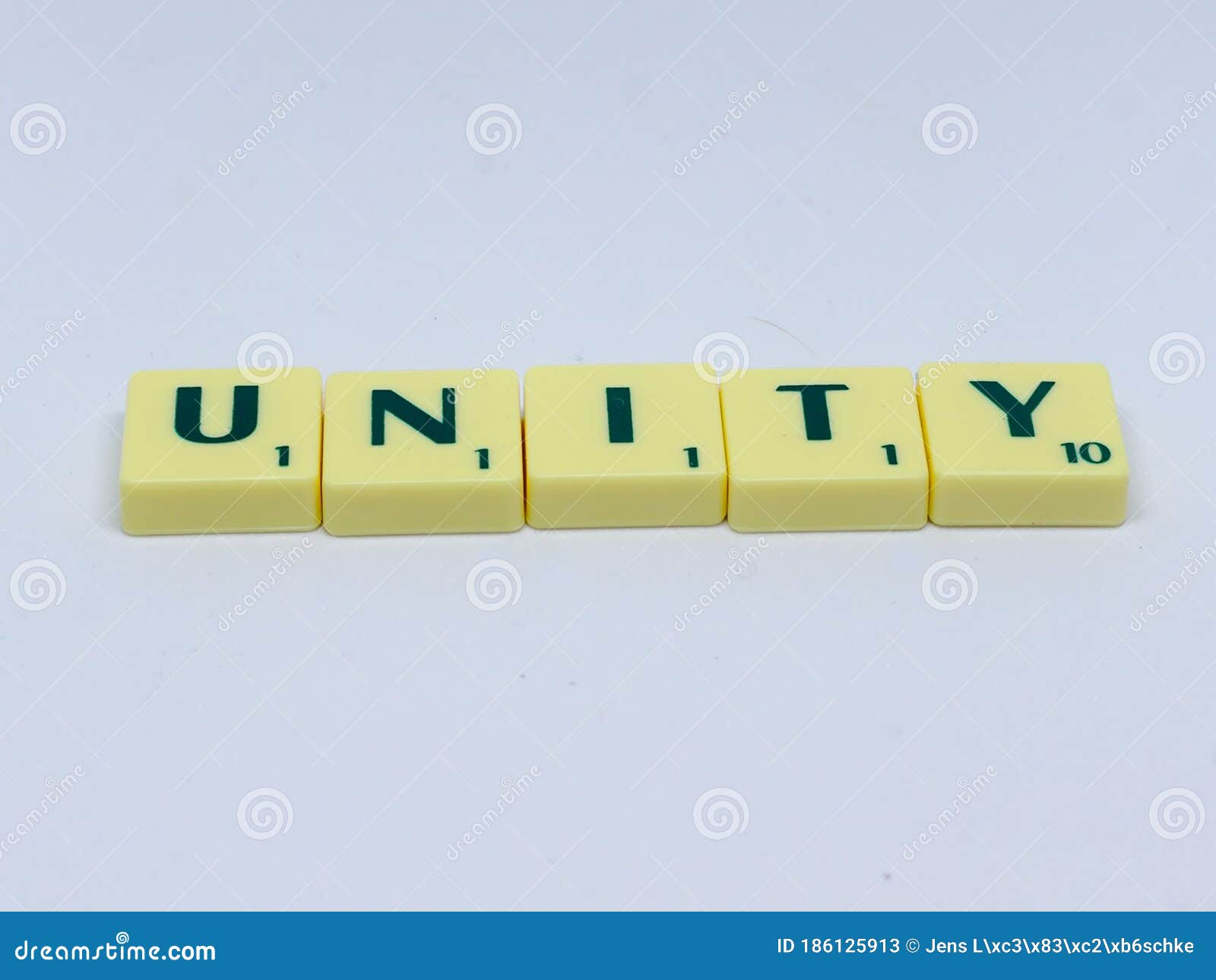 Unity in Alphabet Letters and Playing Pieces from Board Games Stock ...