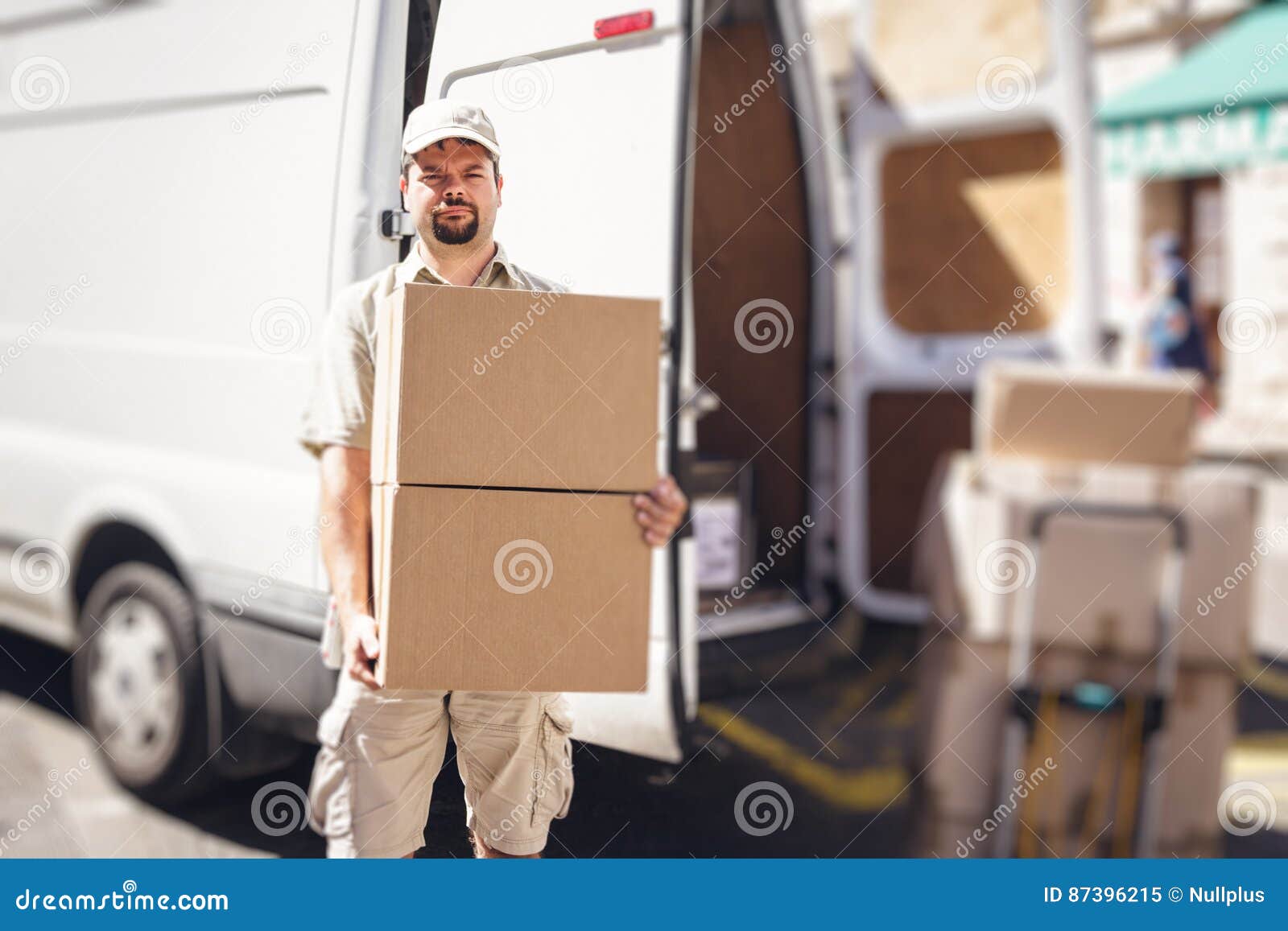 Messenger Delivering Parcel, Standing Next To His Van Stock Image ...