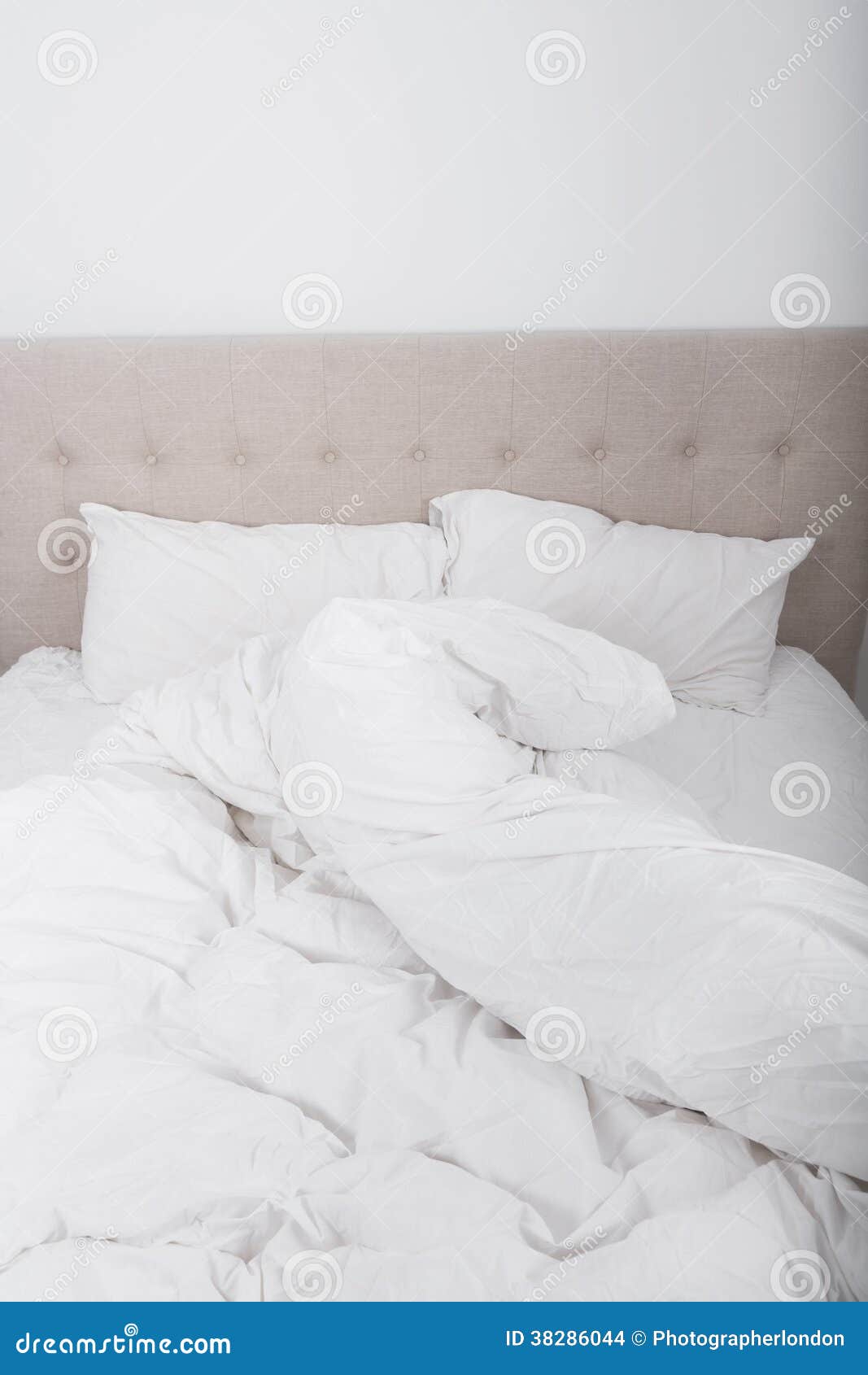 Messy bed in bedroom stock photo. Image of indoors, house - 38286044
