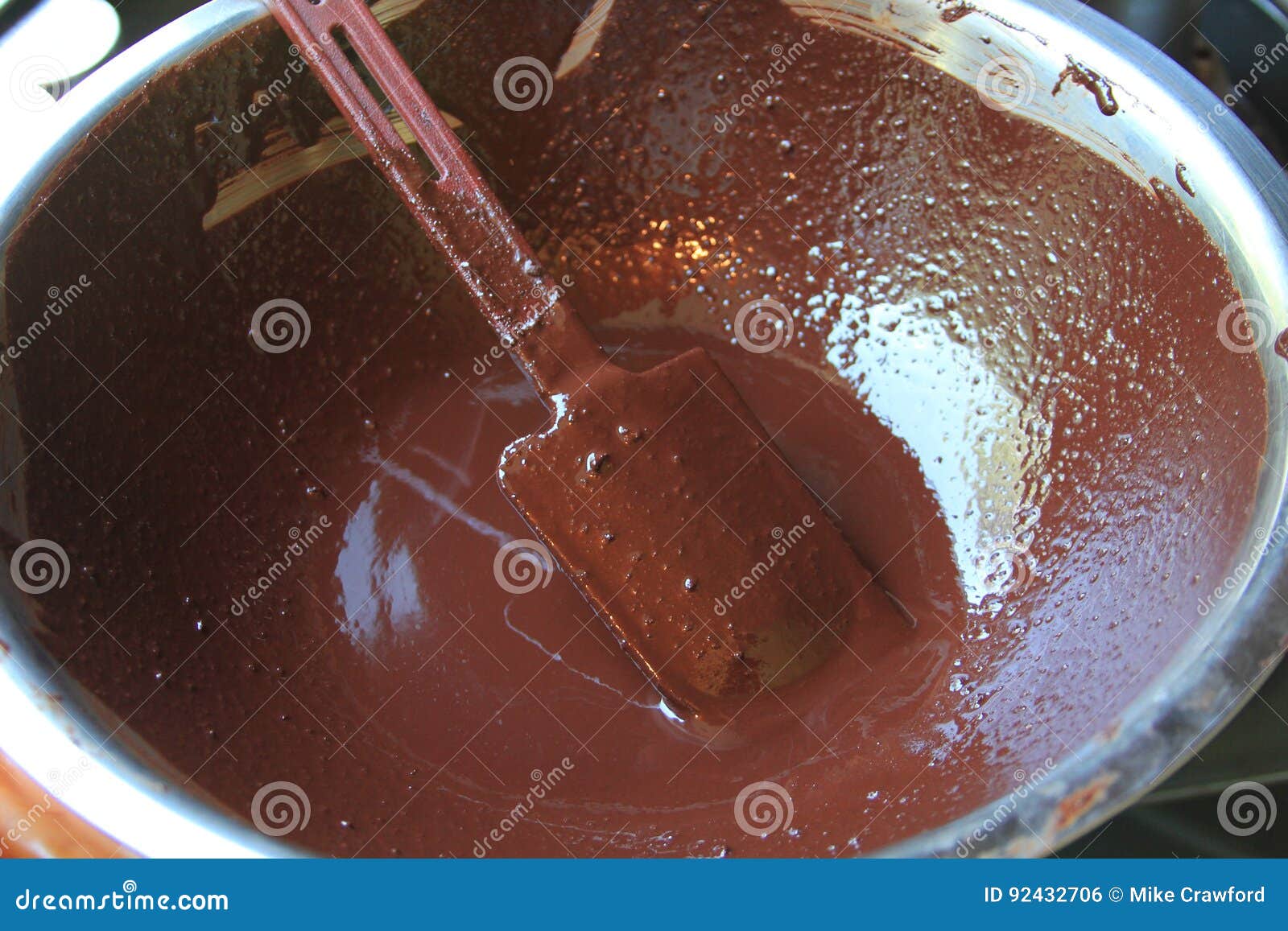 Messy bowl of chocolate stock photo. Image of gold, hands - 92432706