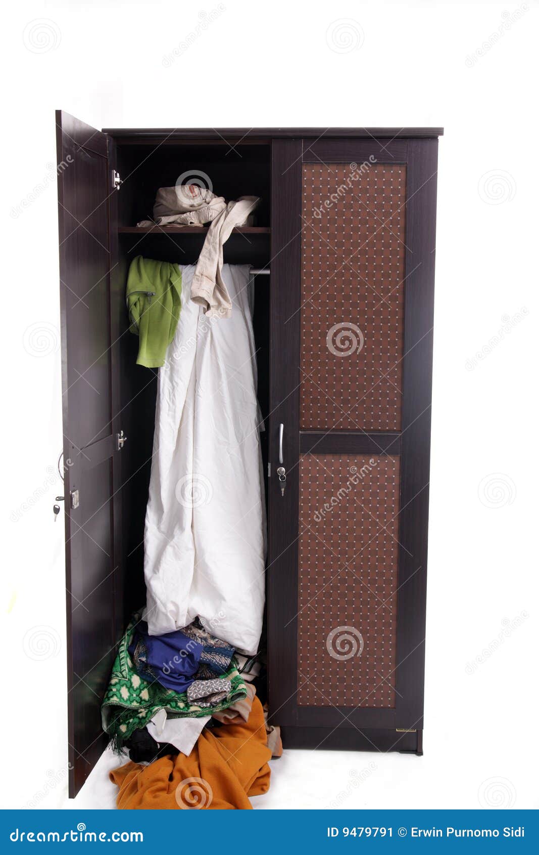 Messy clothes in cupboard stock image. Image of home, laundry - 9479791