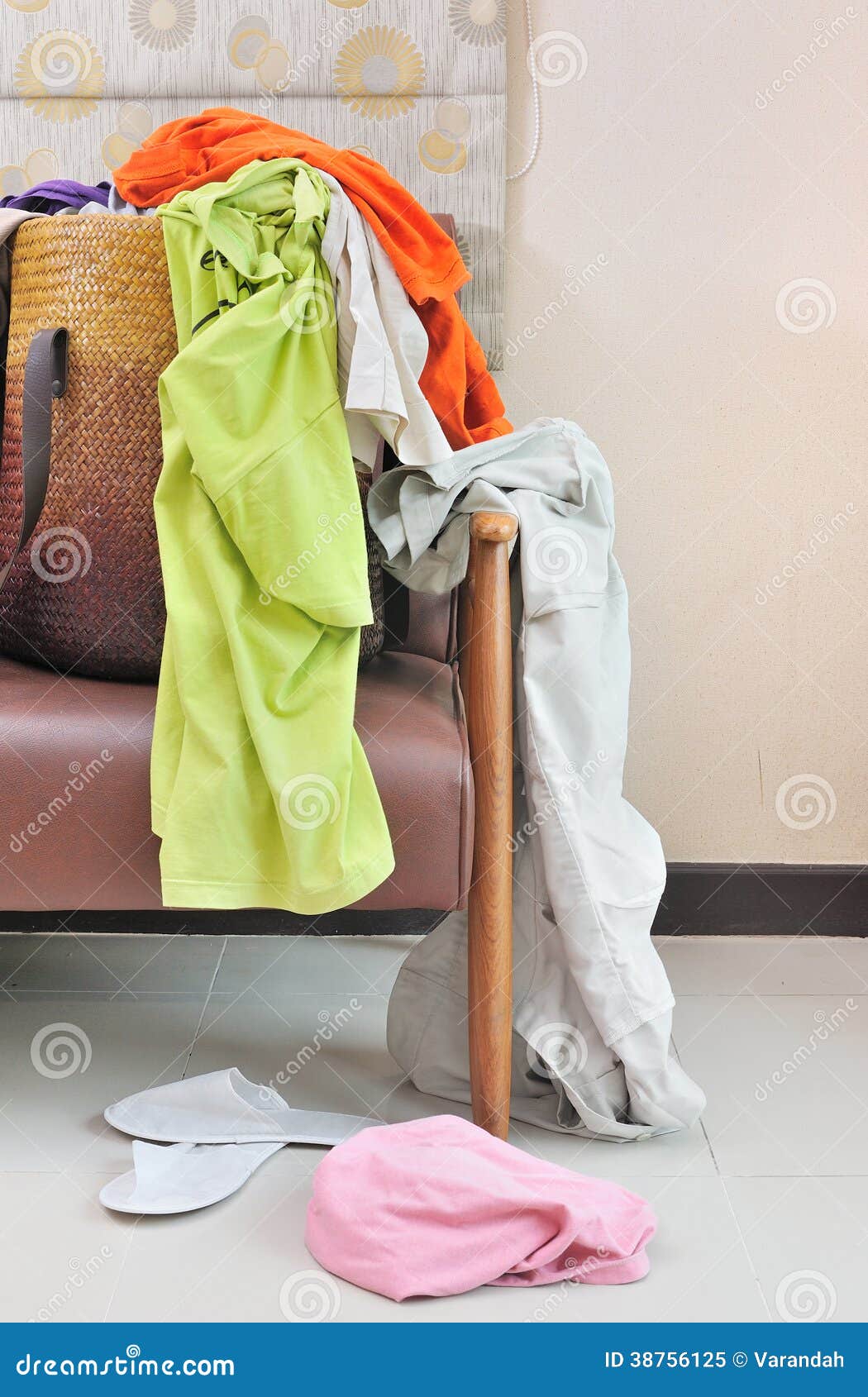 Messy Clothes Scattered on a Leather Sofa Stock Image - Image of living ...