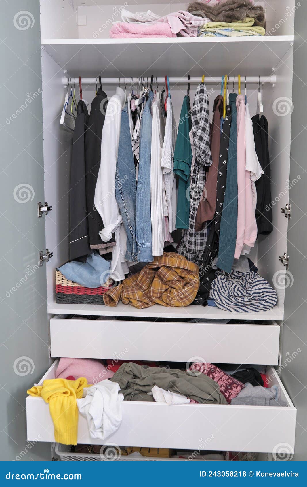 Messy Clothes Thrown on a Shelf. Dressing Room Mess, Decluttering ...