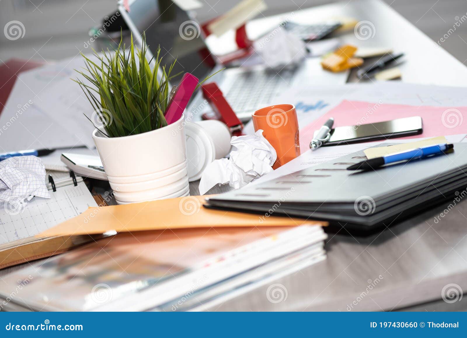 Messy and cluttered desk stock photo. Image of cluttered - 197430660