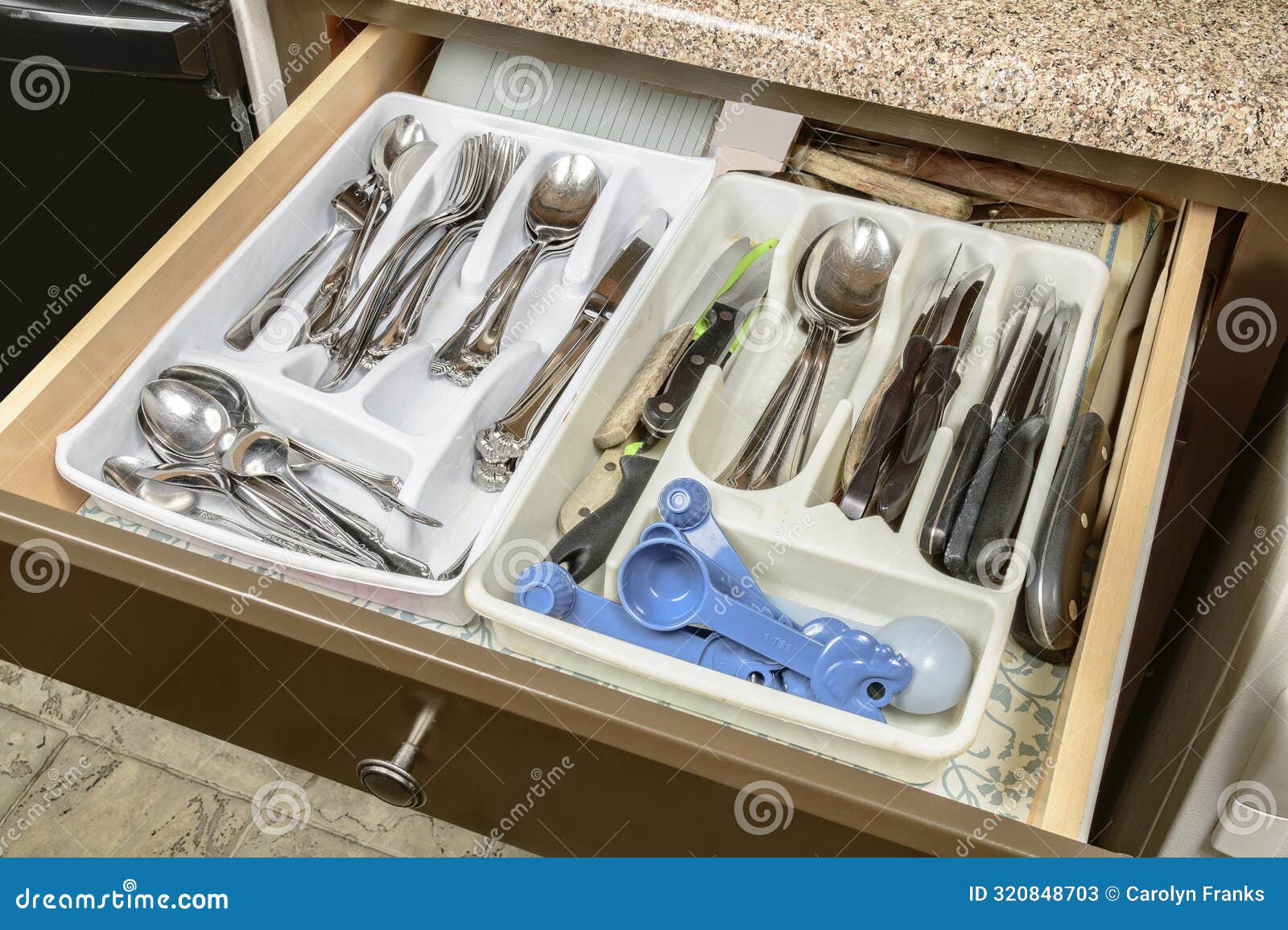 Messy and Cluttered Silverware Drawer in Home of Elderly People Stock ...