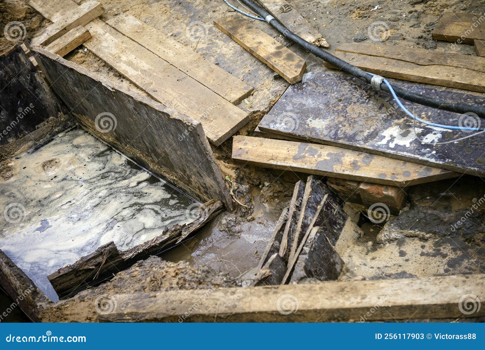 Messy Construction Site: A Pile Of Red Brick, Staked Bricks Among ...