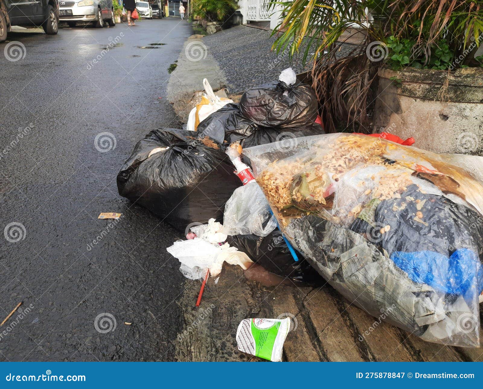 Messy and Dirty Garbage Next To Residential Road Stock Image - Image of ...