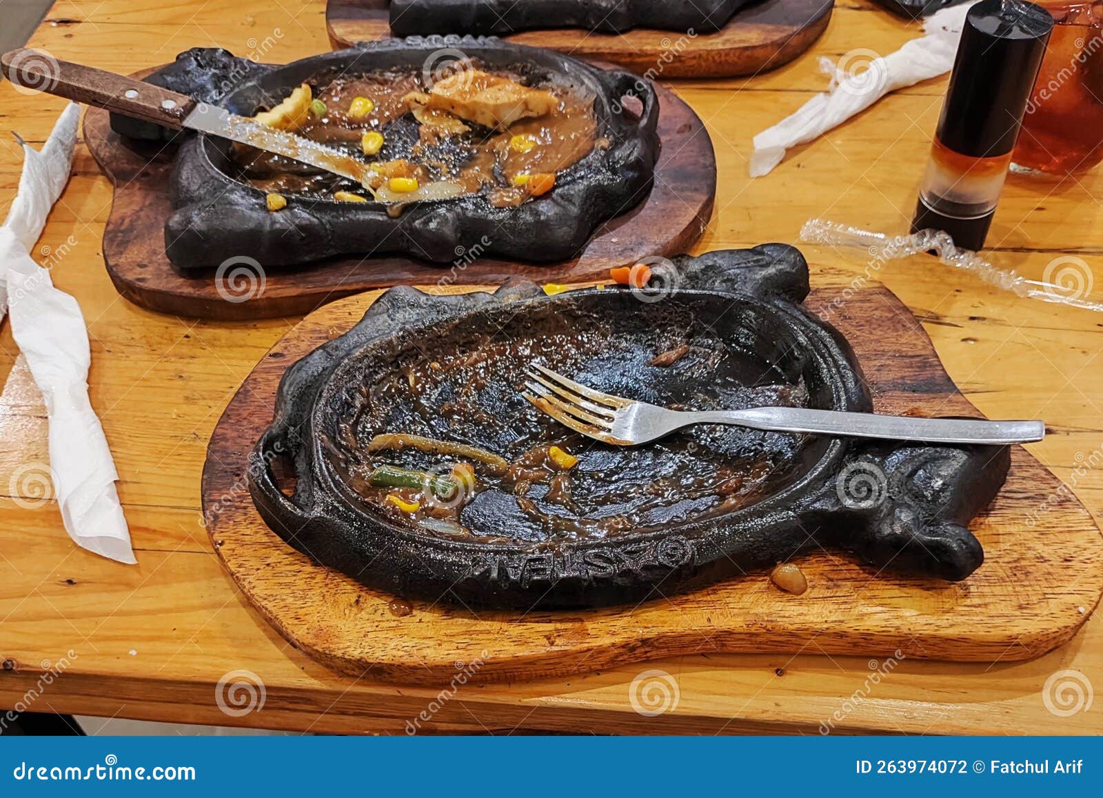 Messy Dinner Plate Of Chicken Bones Left After Eating The Meat Off Them ...