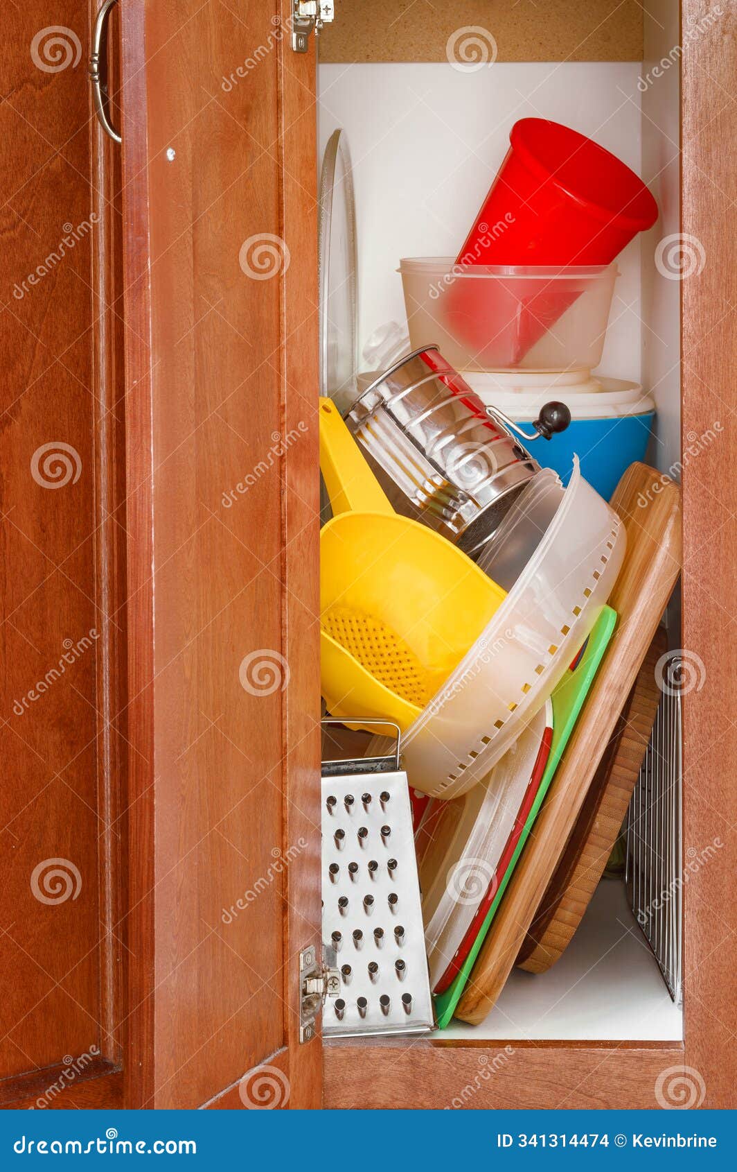 Messy Kitchen Cabinet or Cupboard Stock Photo - Image of utensils ...