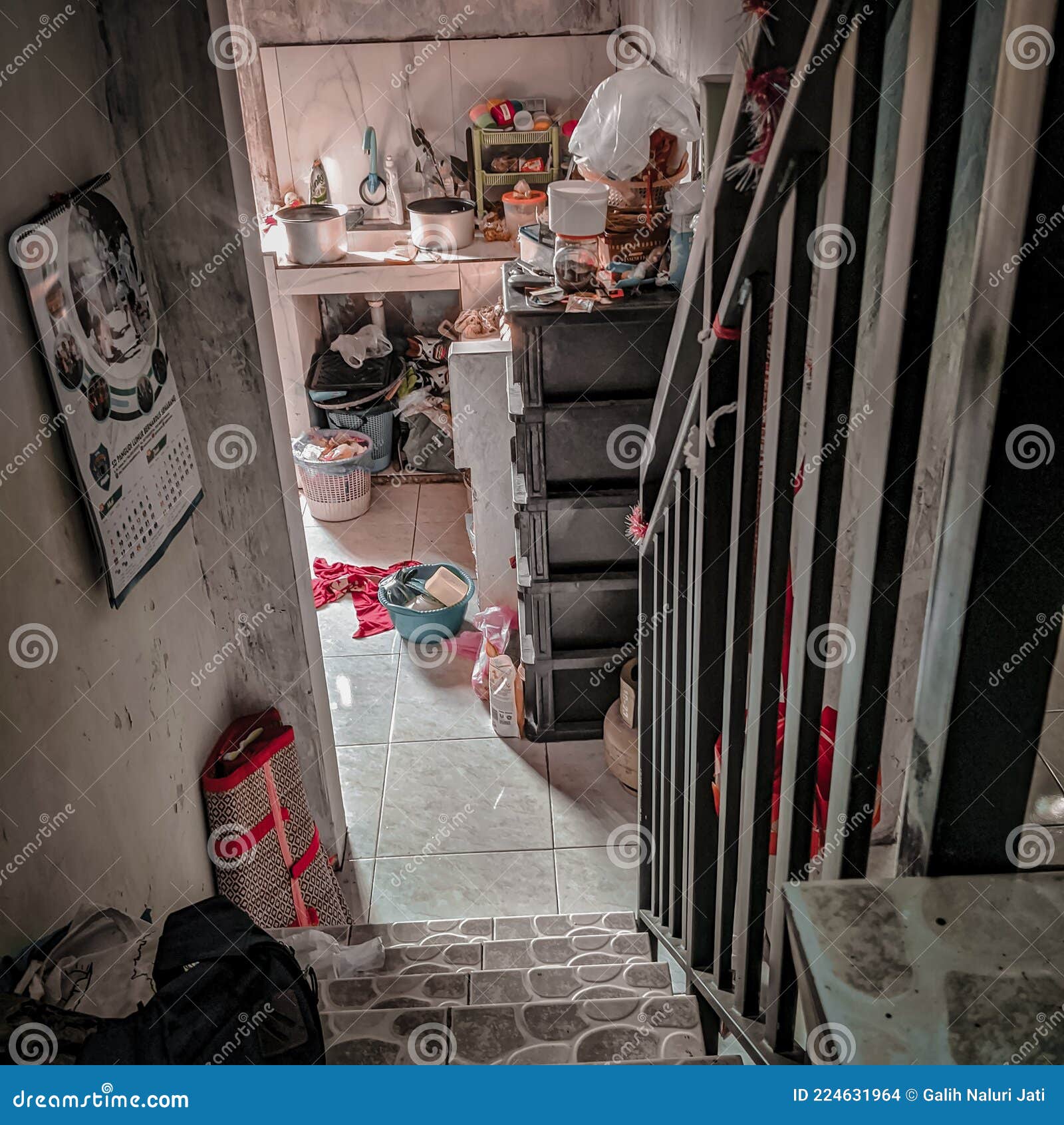 Messy Kitchen Seen from the Top of the Stairs Stock Photo - Image of ...