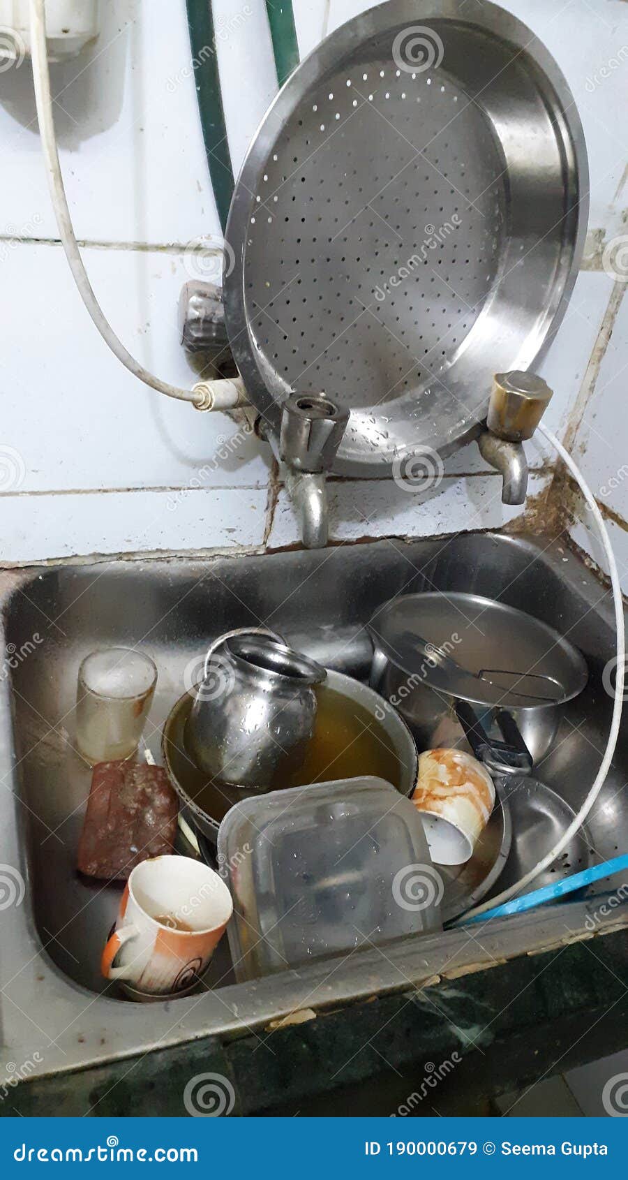 Utensils in a Messy Kitchen Stock Image - Image of small, poor: 190000679