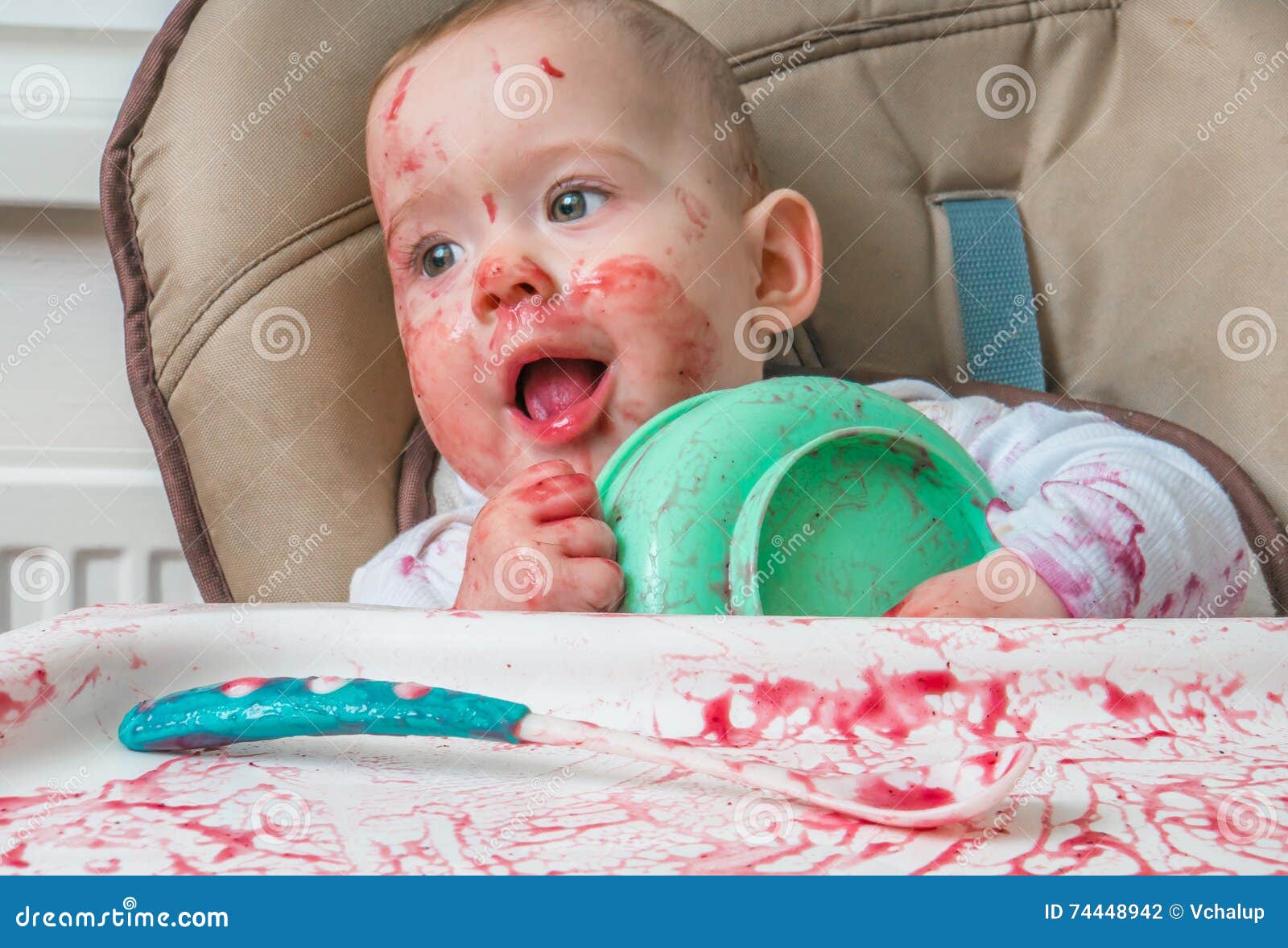 Messy Little Baby is Eating Dinner from Bowl Stock Photo - Image of ...