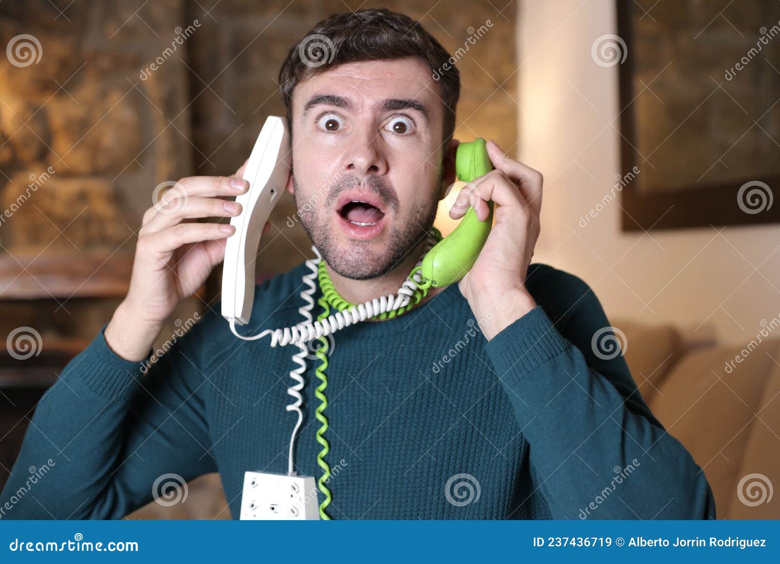 Messy Man Using Two Landline Telephones at the Same Time Stock Image ...