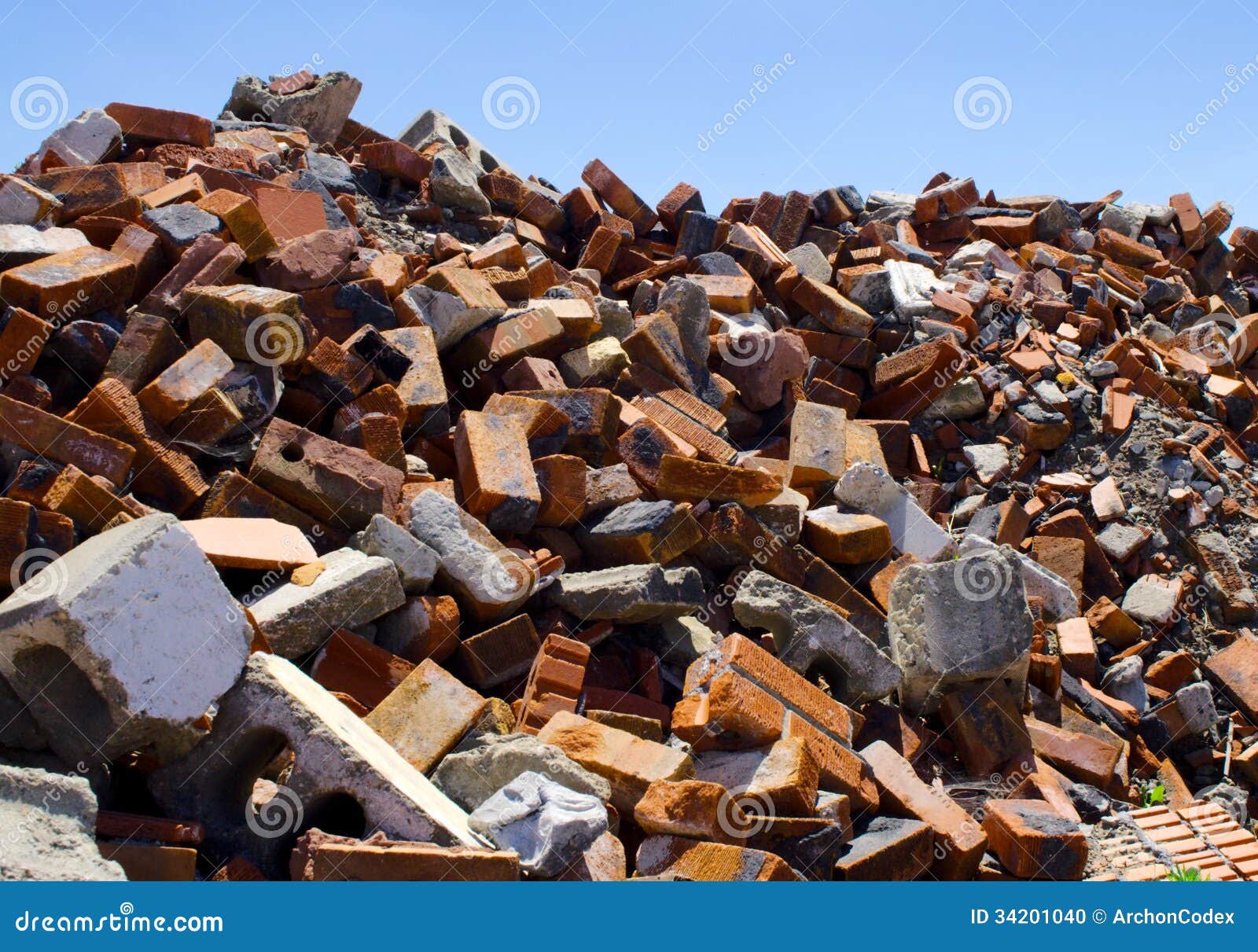 Messy Pile of Bricks on Blue Sky Stock Photo - Image of mortar ...