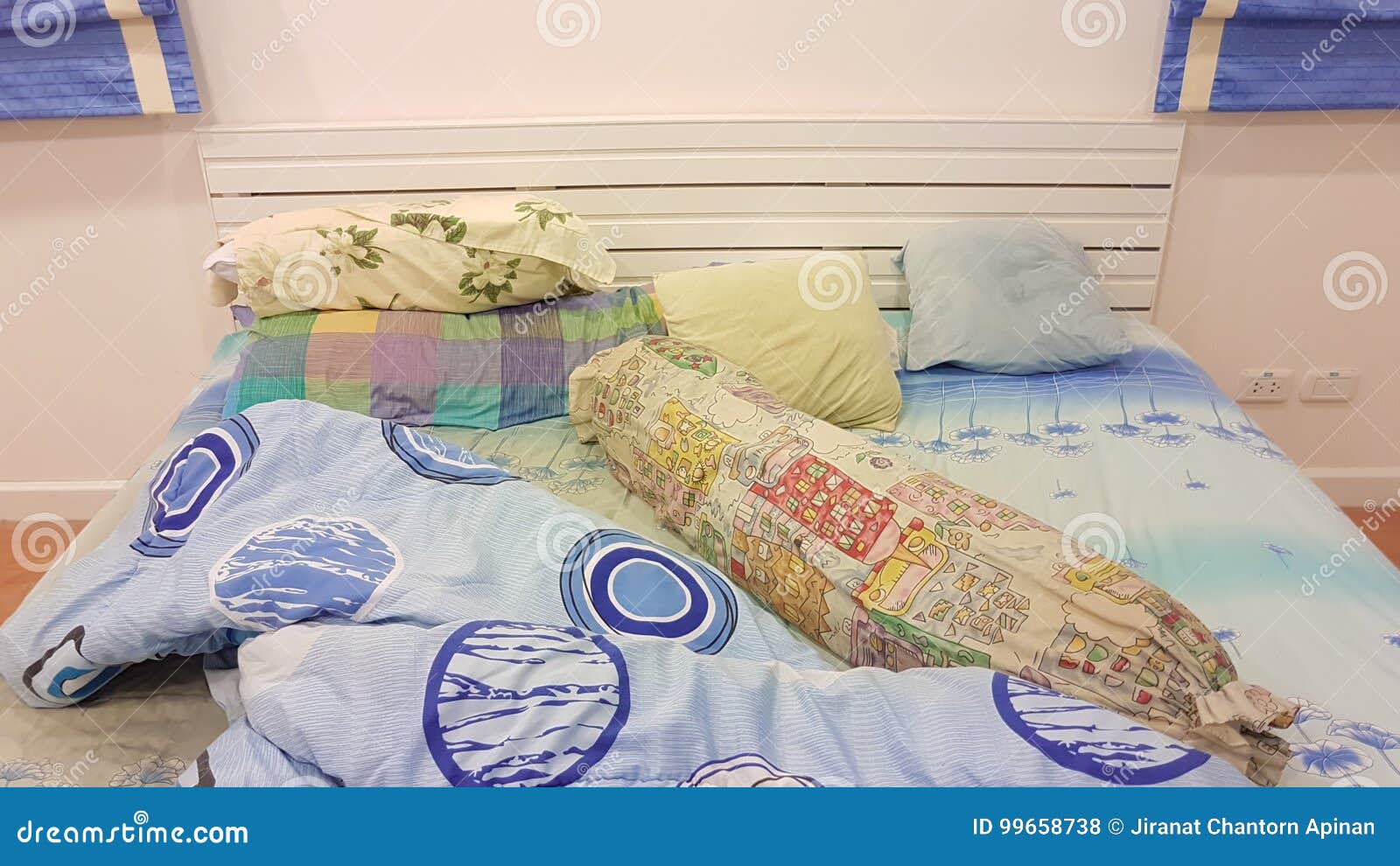 The Messy of Pillow and Blanket on the Bed Stock Photo - Image of ...