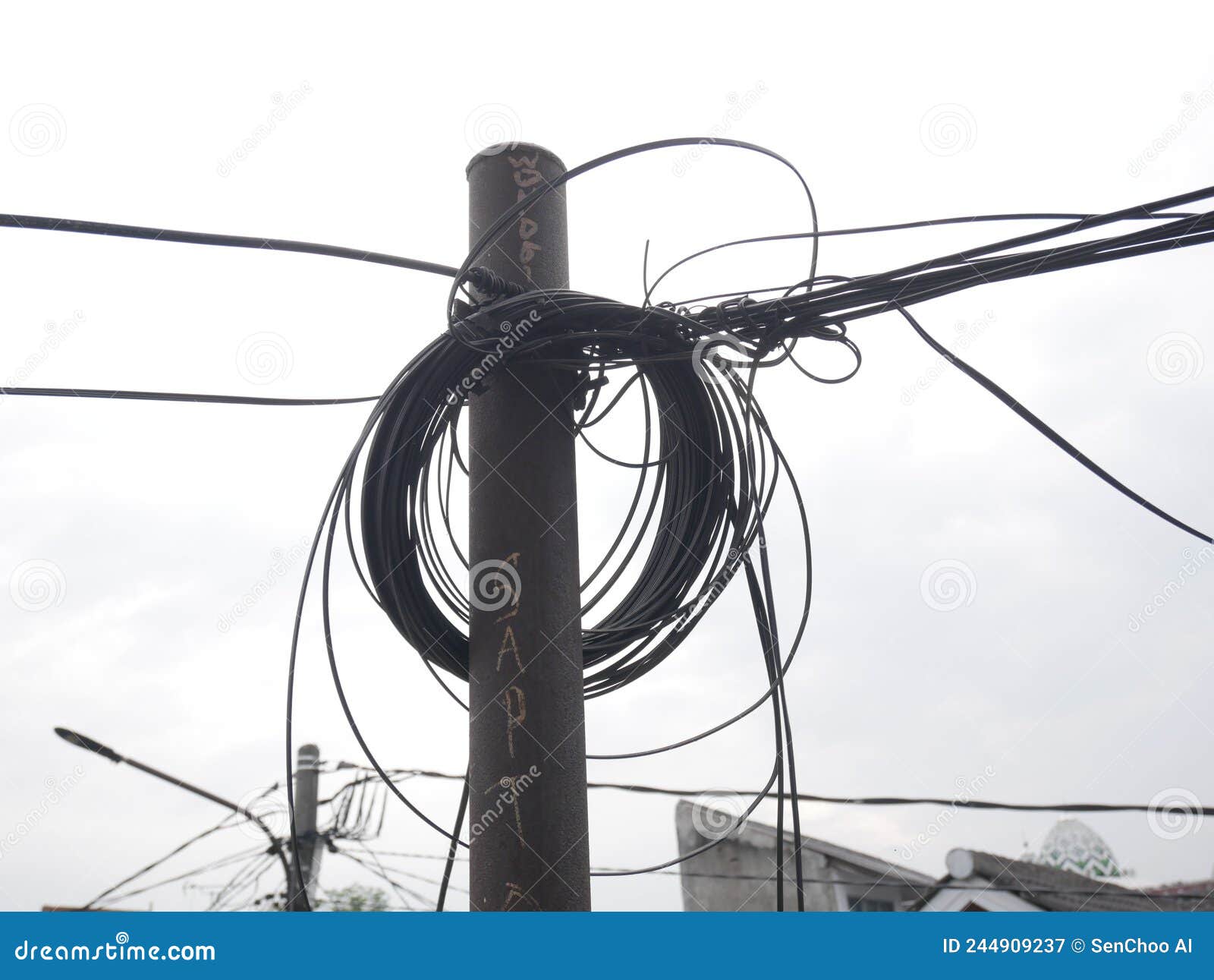 Messy Power Lines Wrapped Around the Poles. Stock Image - Image of ...