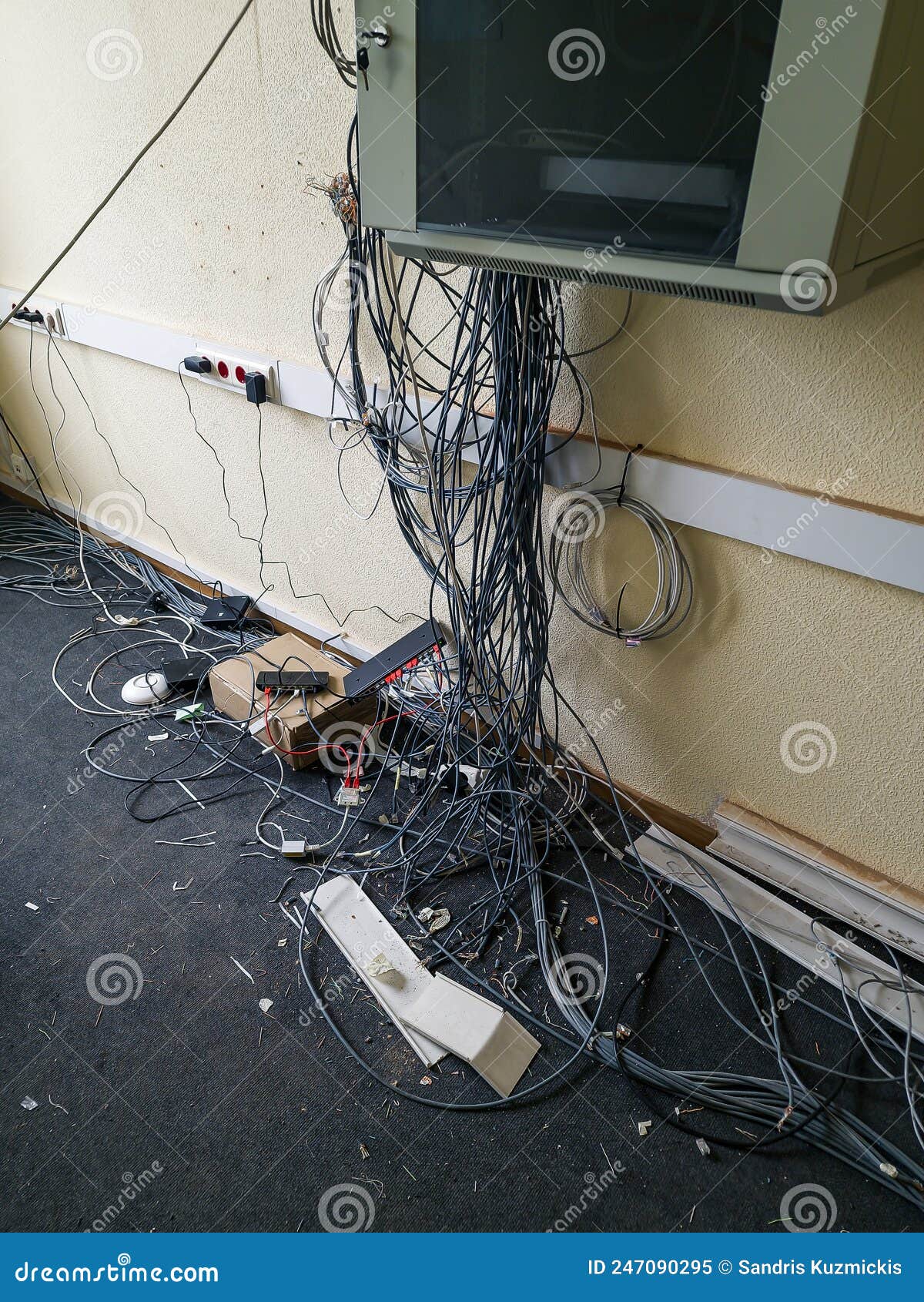 Messy Server Room with Internet Cables, Wires and Various Equipment ...