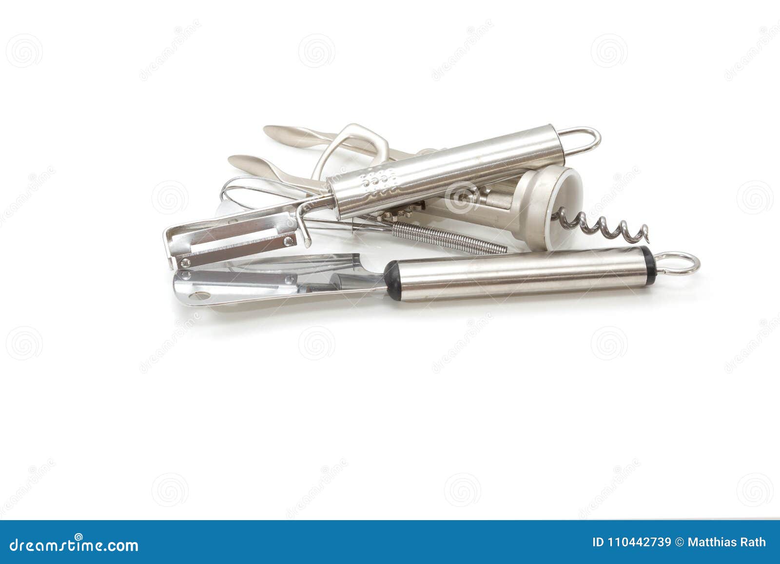 Messy Set of Silverware Against a White Background Stock Image - Image ...