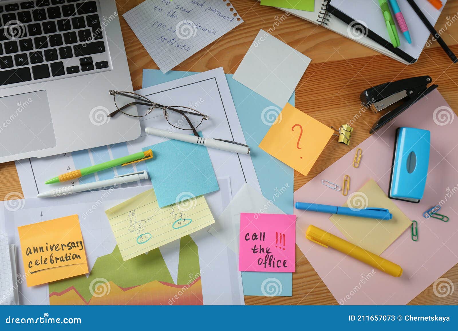 Messy Table with Laptop and Sticky Notes, Flat Lay. Concept of Being ...