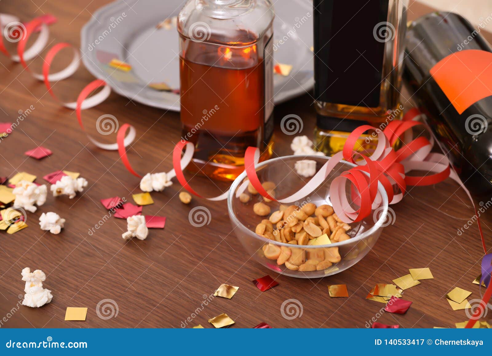 Messy Table with Popcorn, Bottles and Streamers Stock Image - Image of ...