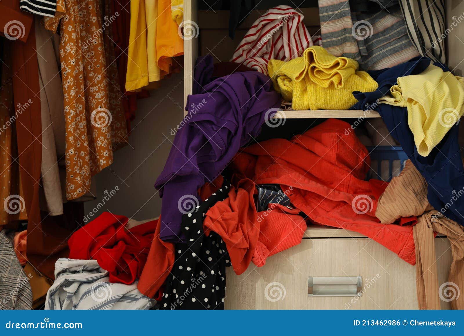 Messy Wardrobe With Different Clothes Indoors. Fast Fashion Concept ...