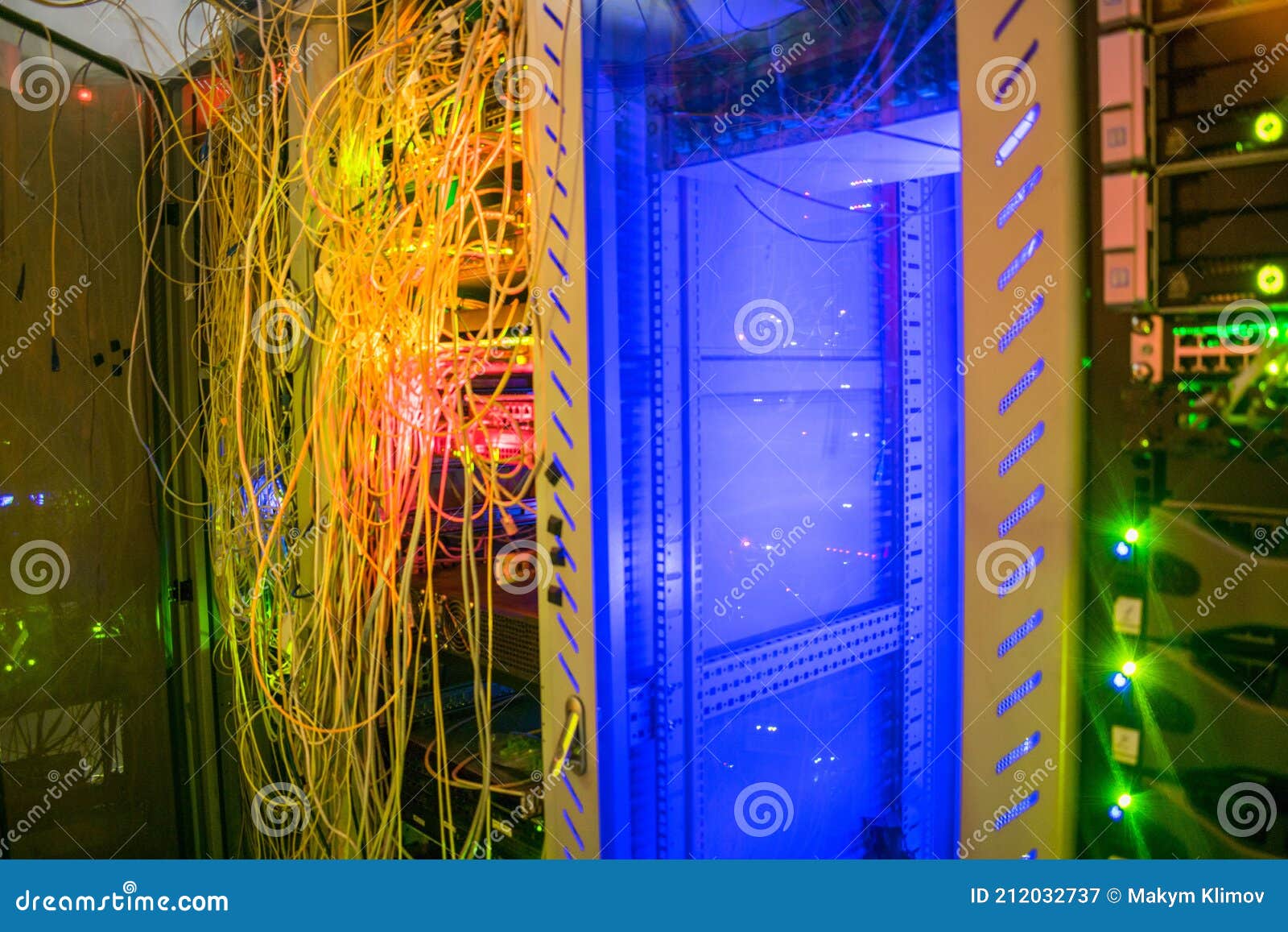 Messy Wires are Connected in a Server Rack. a Lot of Cables are ...