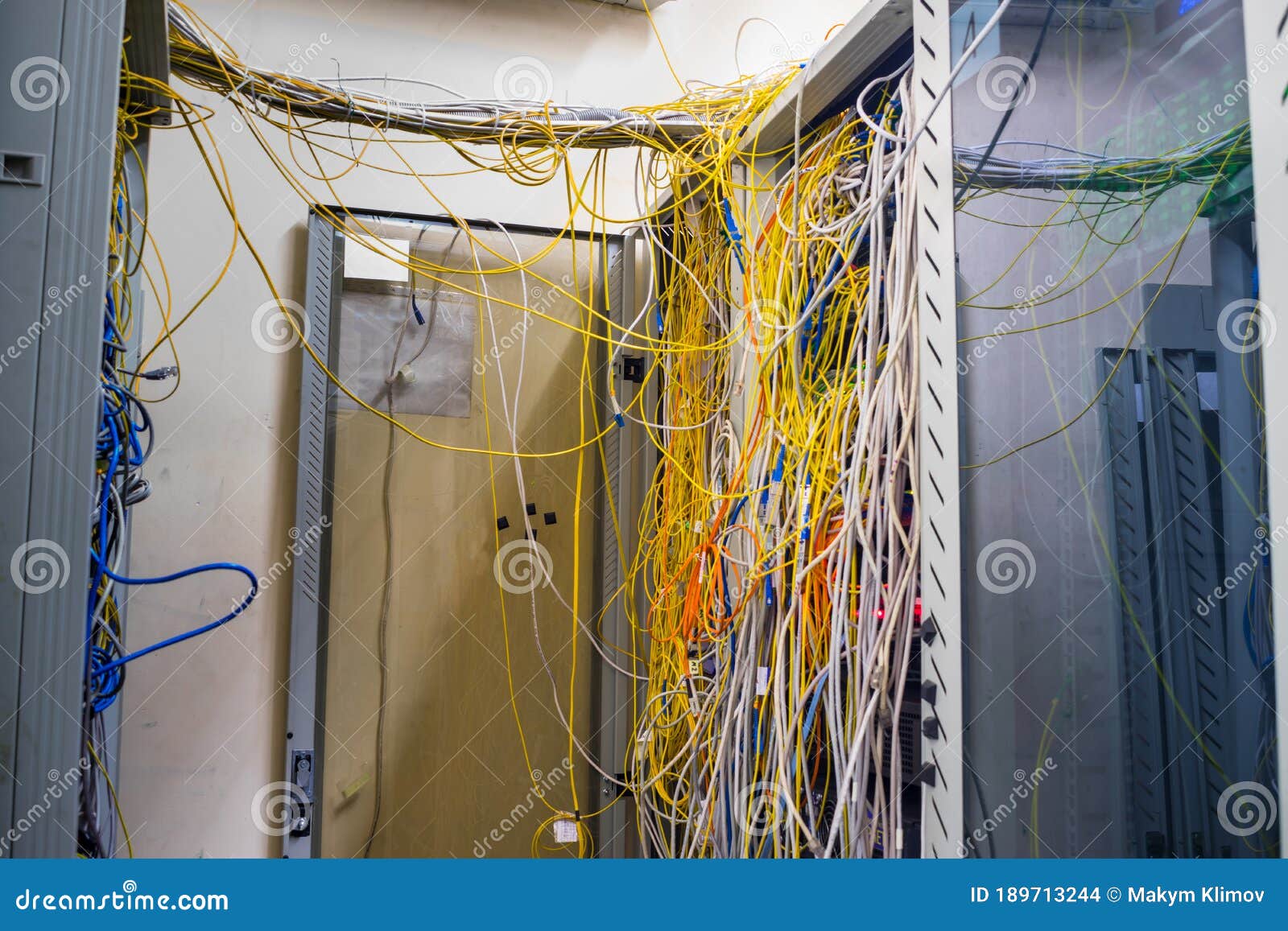 Messy Yellow Optic Cables are Randomly Entangled with Each Other Server ...