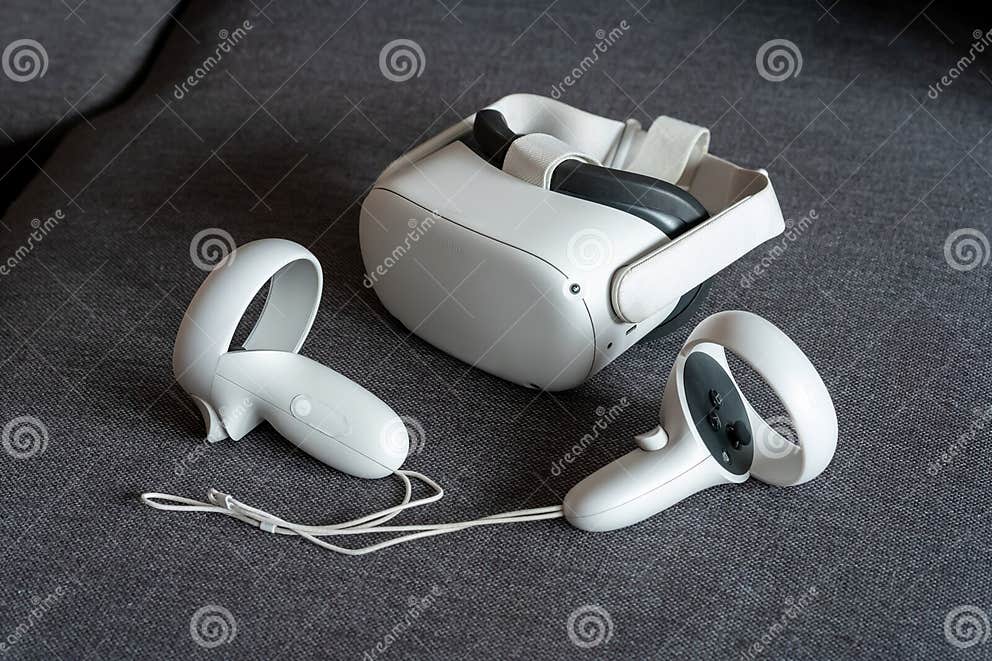 Meta Quest 2 Virtual Reality Headset with Controllers on a Sofa. Standalone Wireless and Wired ...
